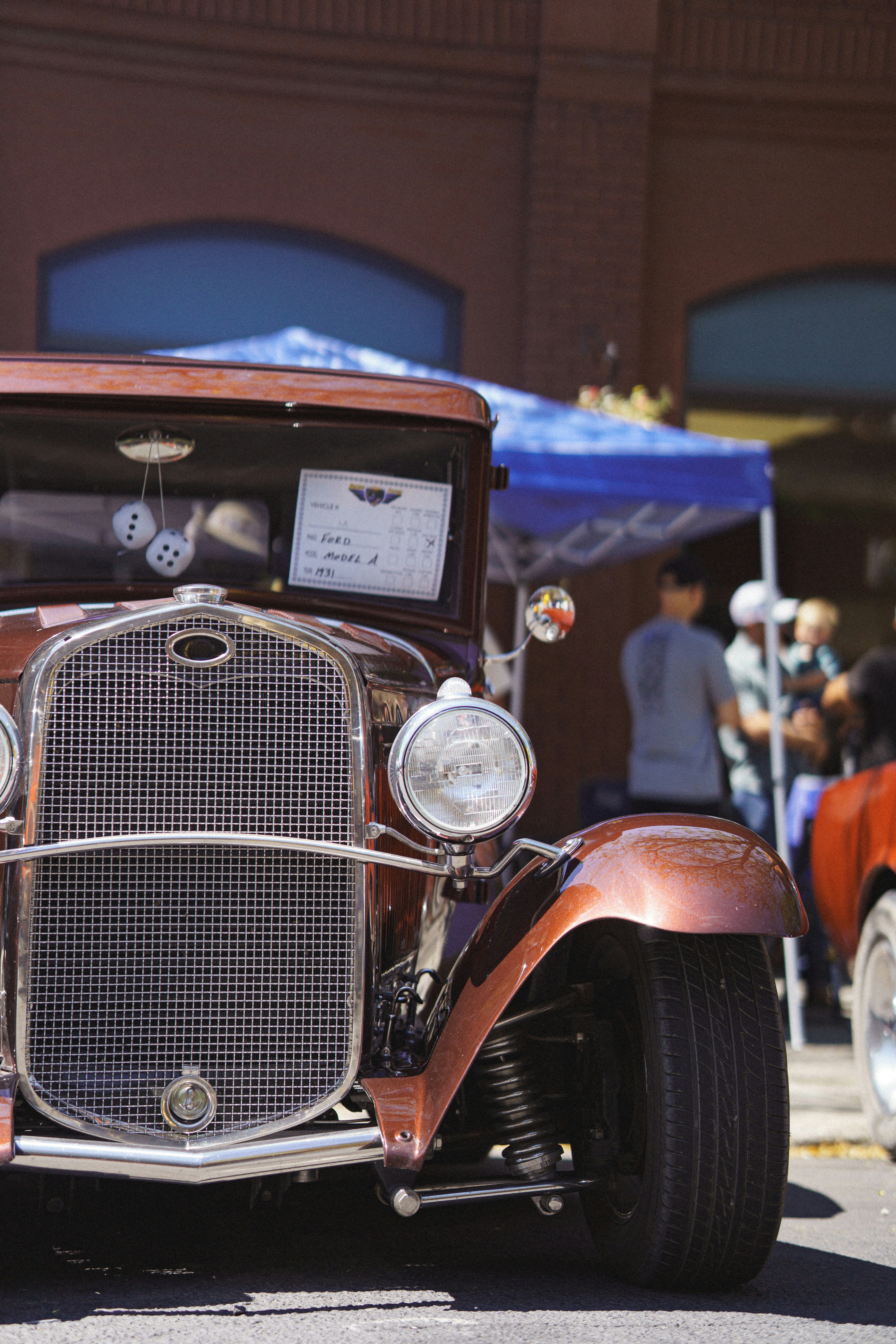 Copper Glow on Chrome Grille: A Classic Car at the Show