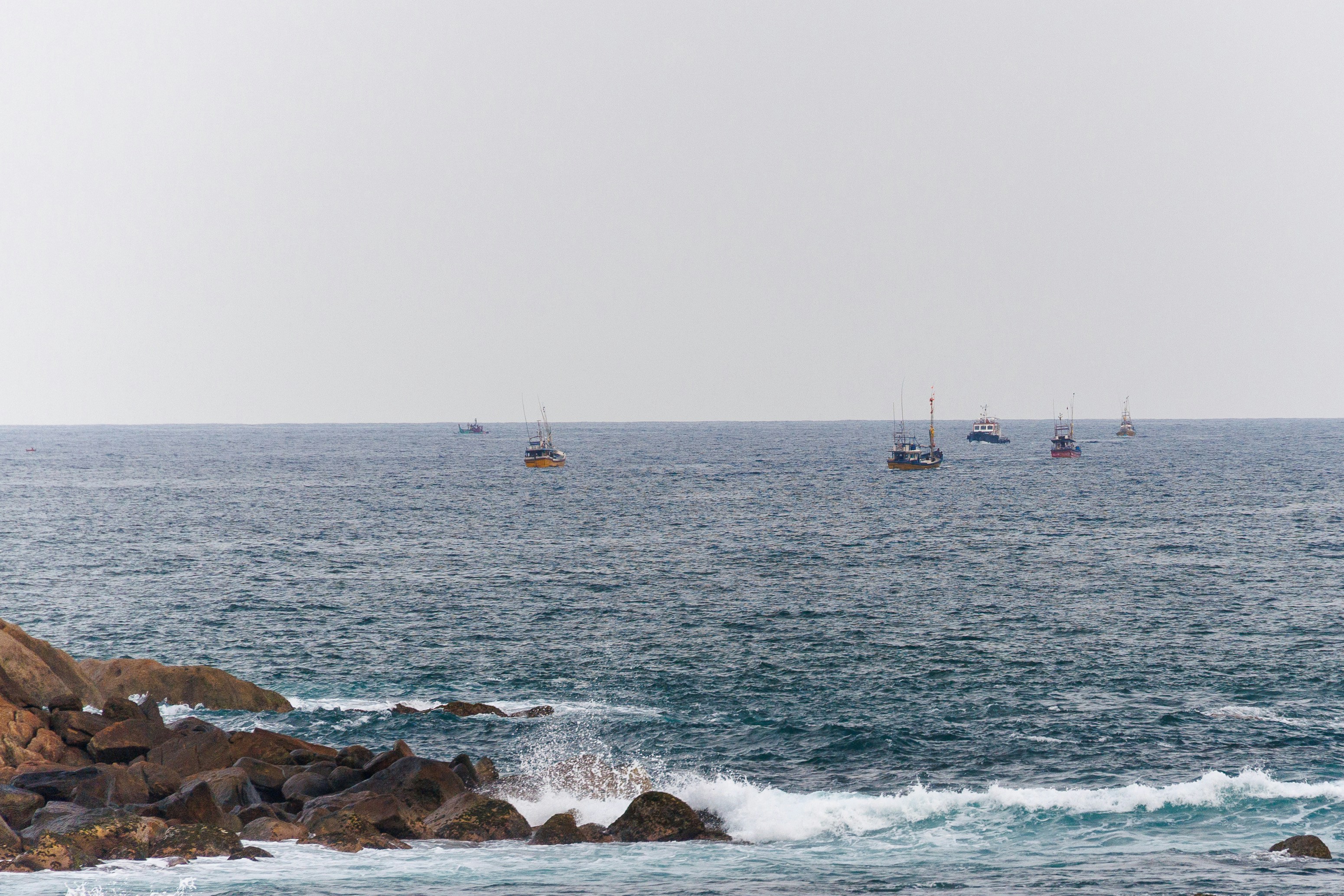 Distant Fleet Across a Granite-Edged Sea