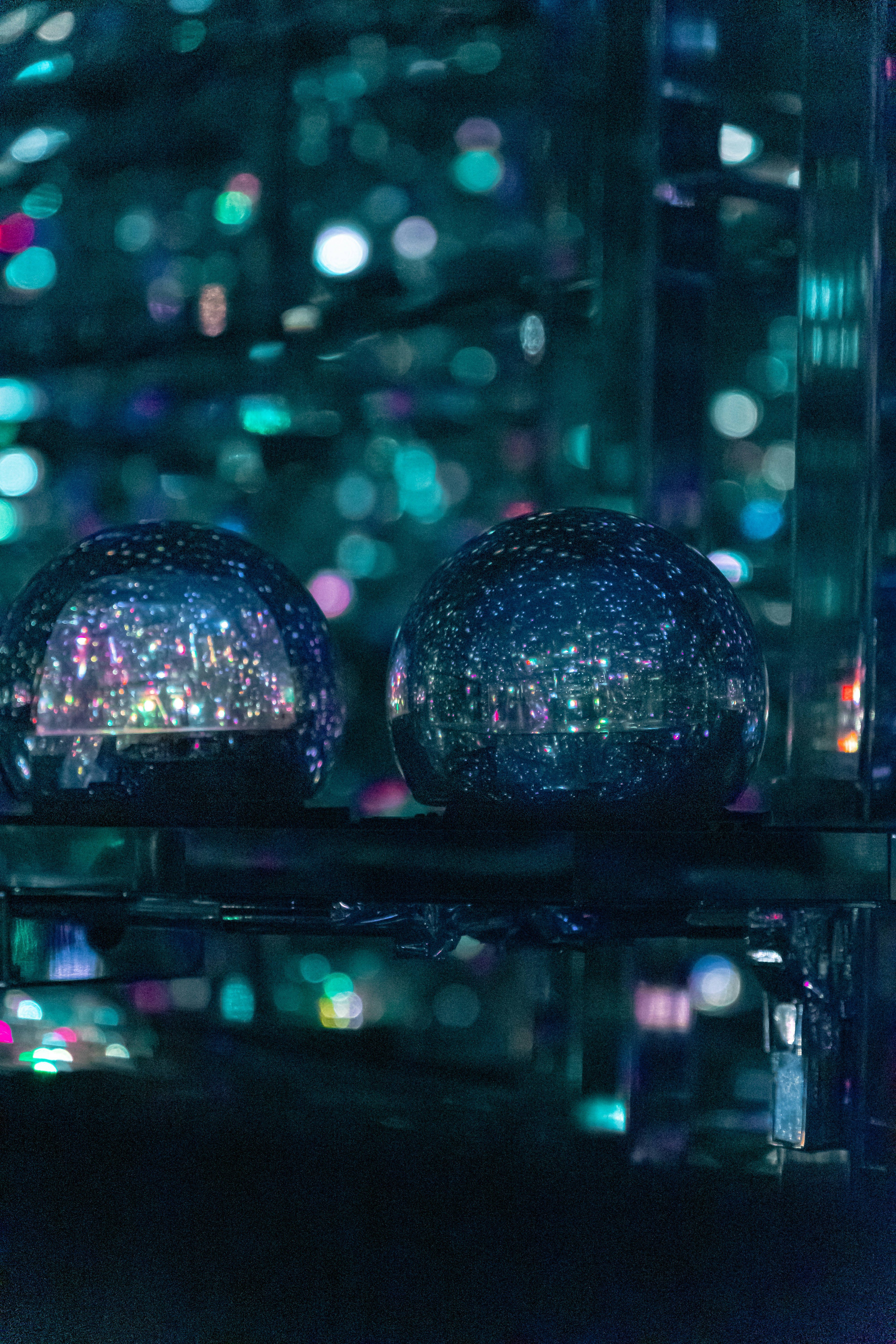 Reflecting spheres create a sparkling, surreal effect.