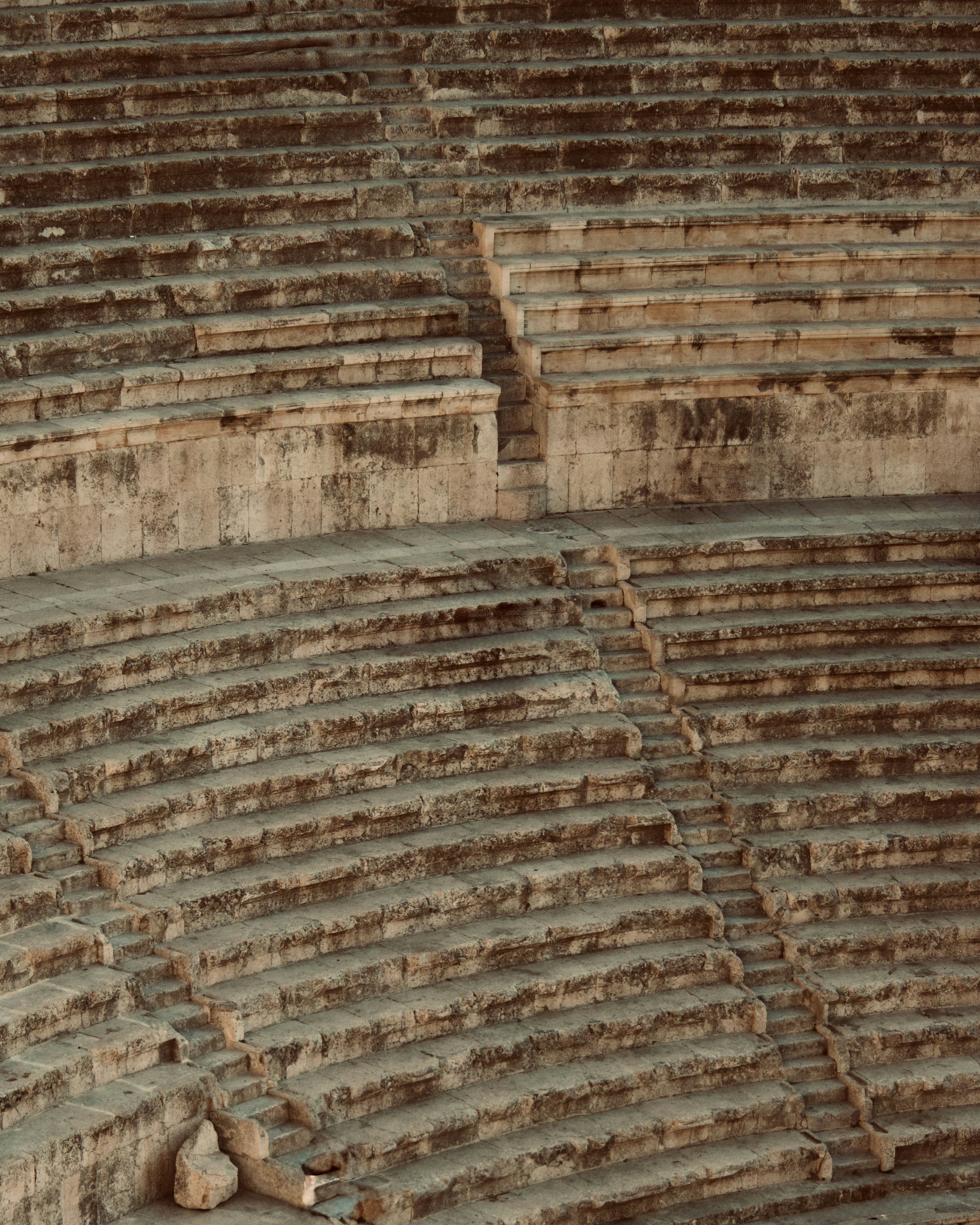 Converging Ridges: Timeworn Stone Seating of an Ancient Amphitheater