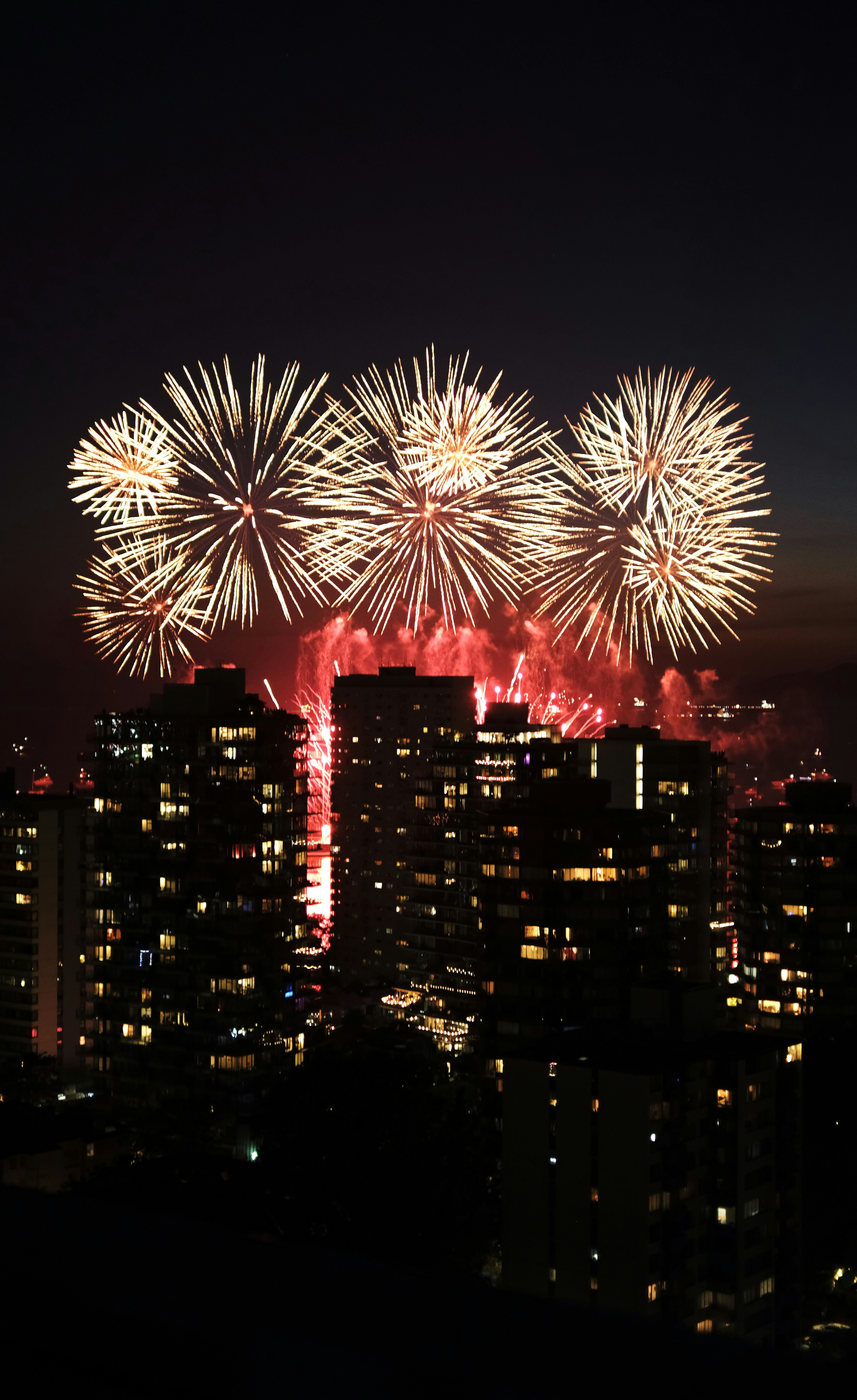 Instagram - @kaprion | Fireworks light up the city skyline at night.