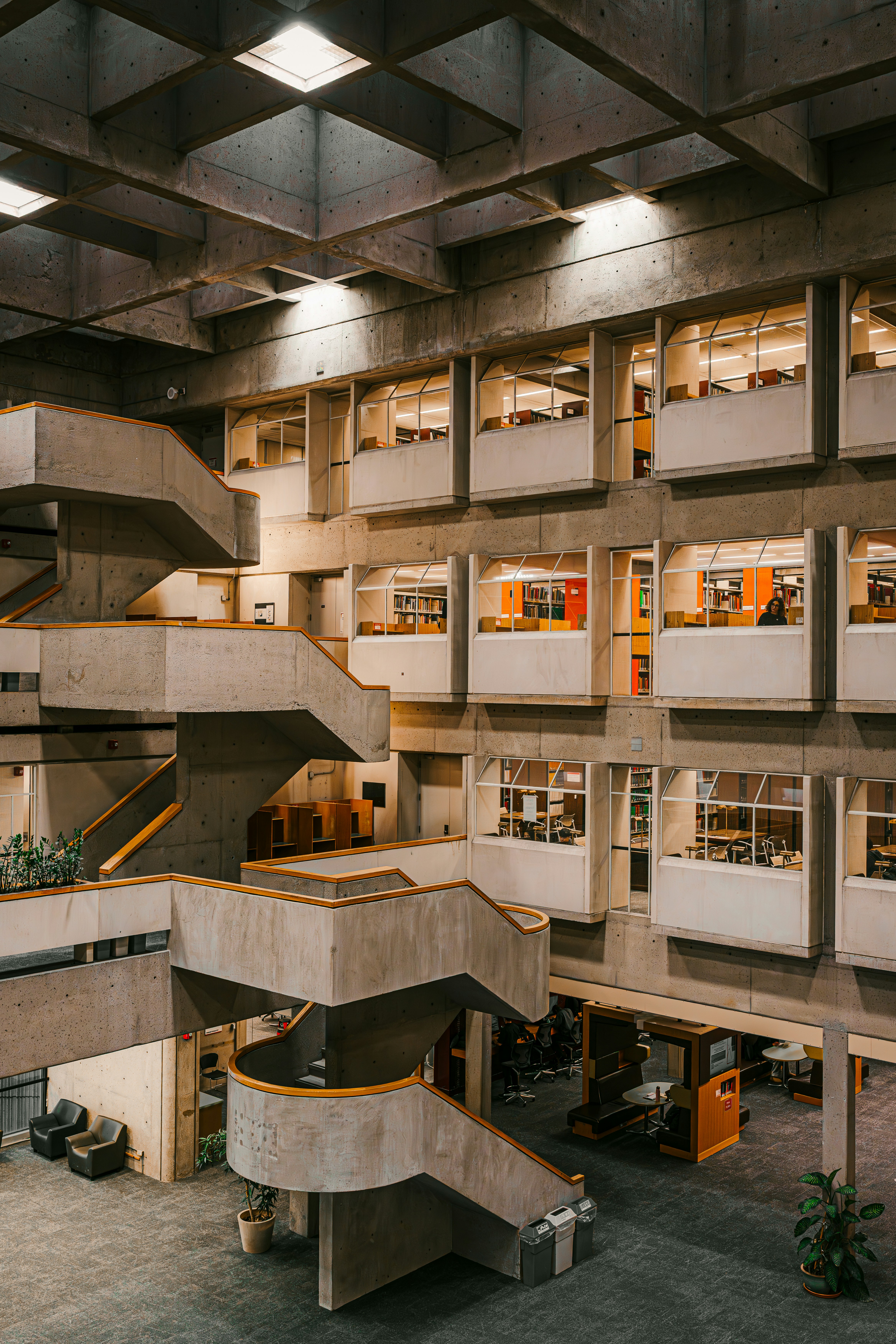 A modern building displays concrete staircases and windows. photo – Free Interior design Image ...