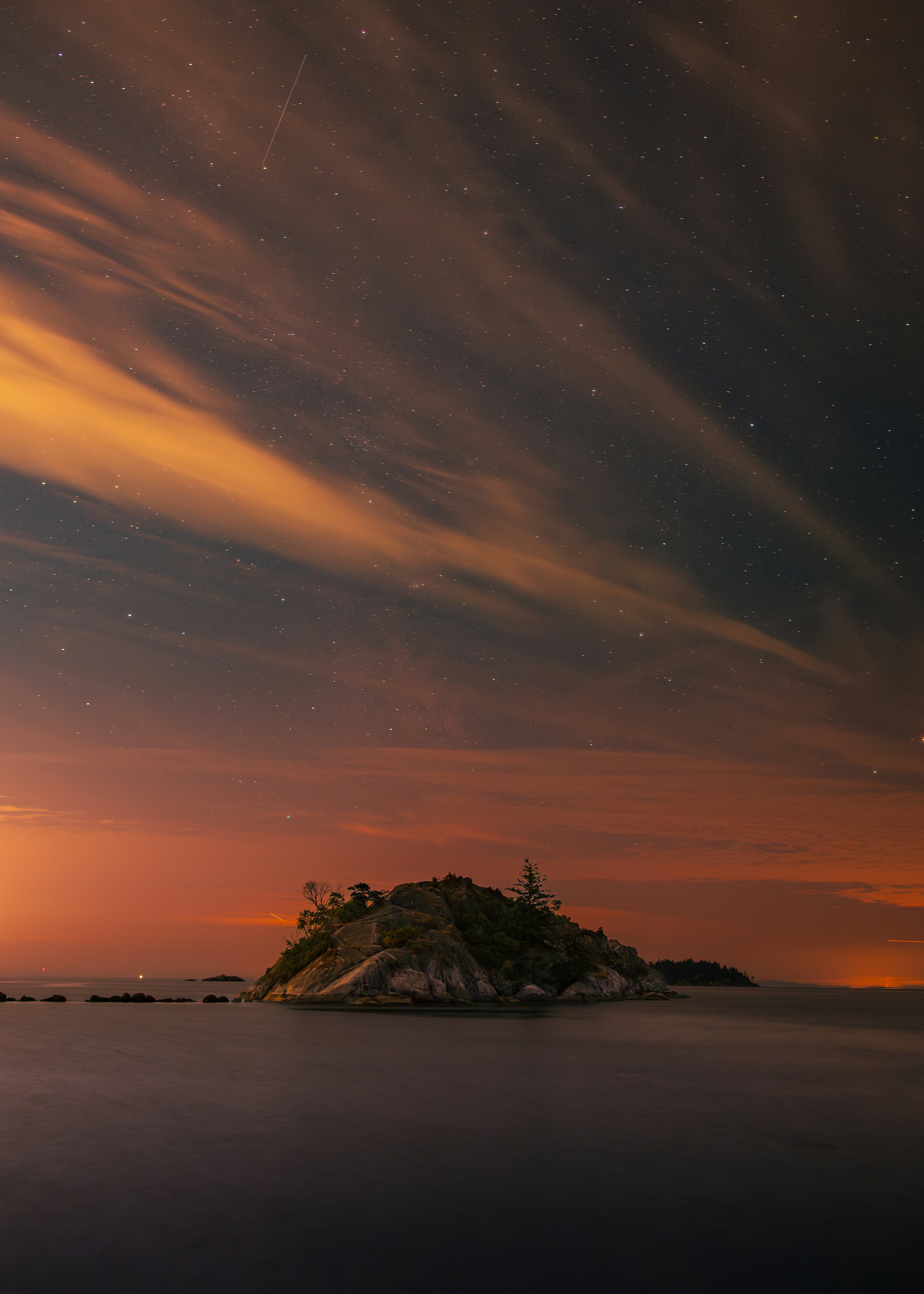 Island sits beneath a starry night sky. photo – Free Wallpaper Image on ...
