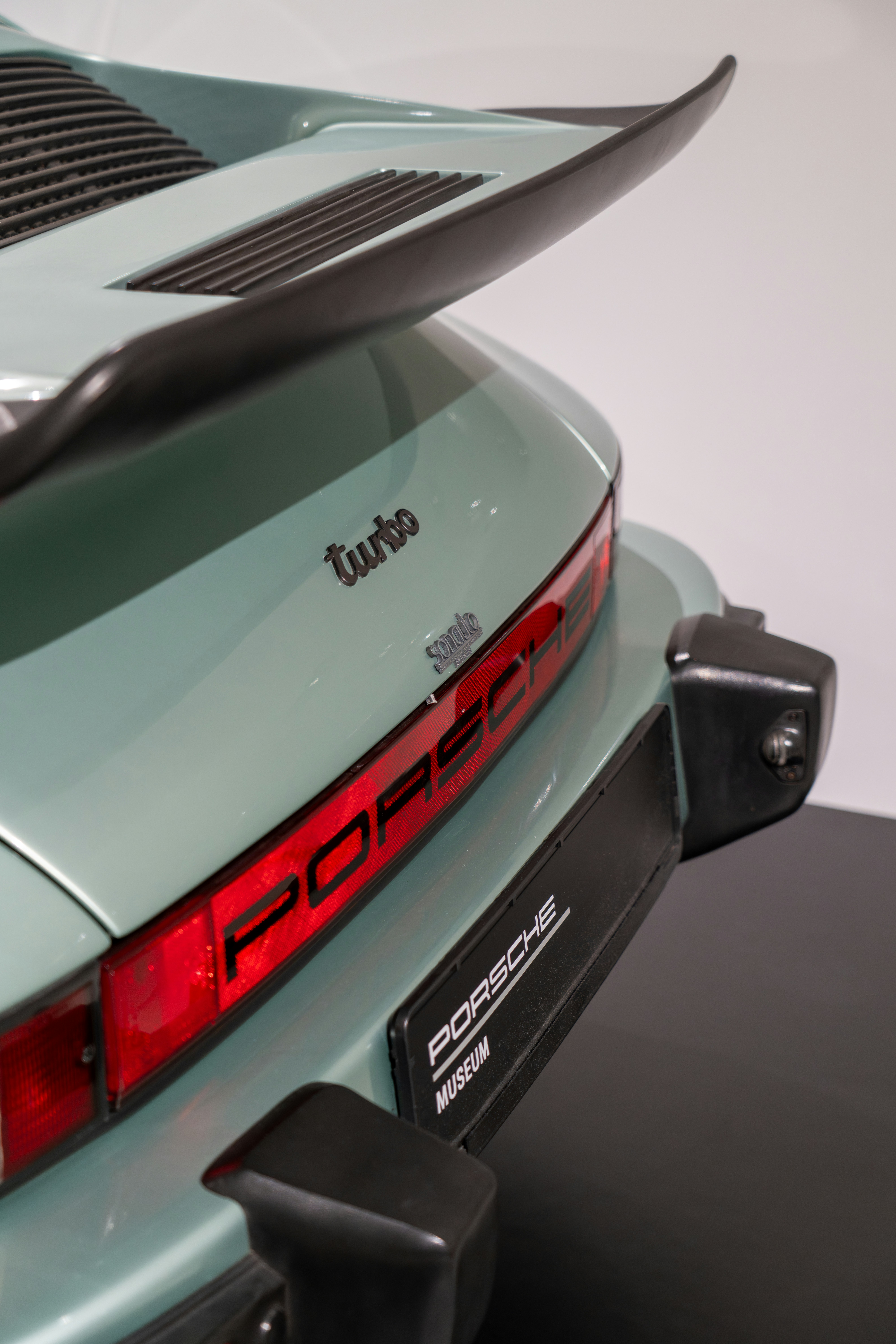 A vintage porsche 911 turbo's rear.