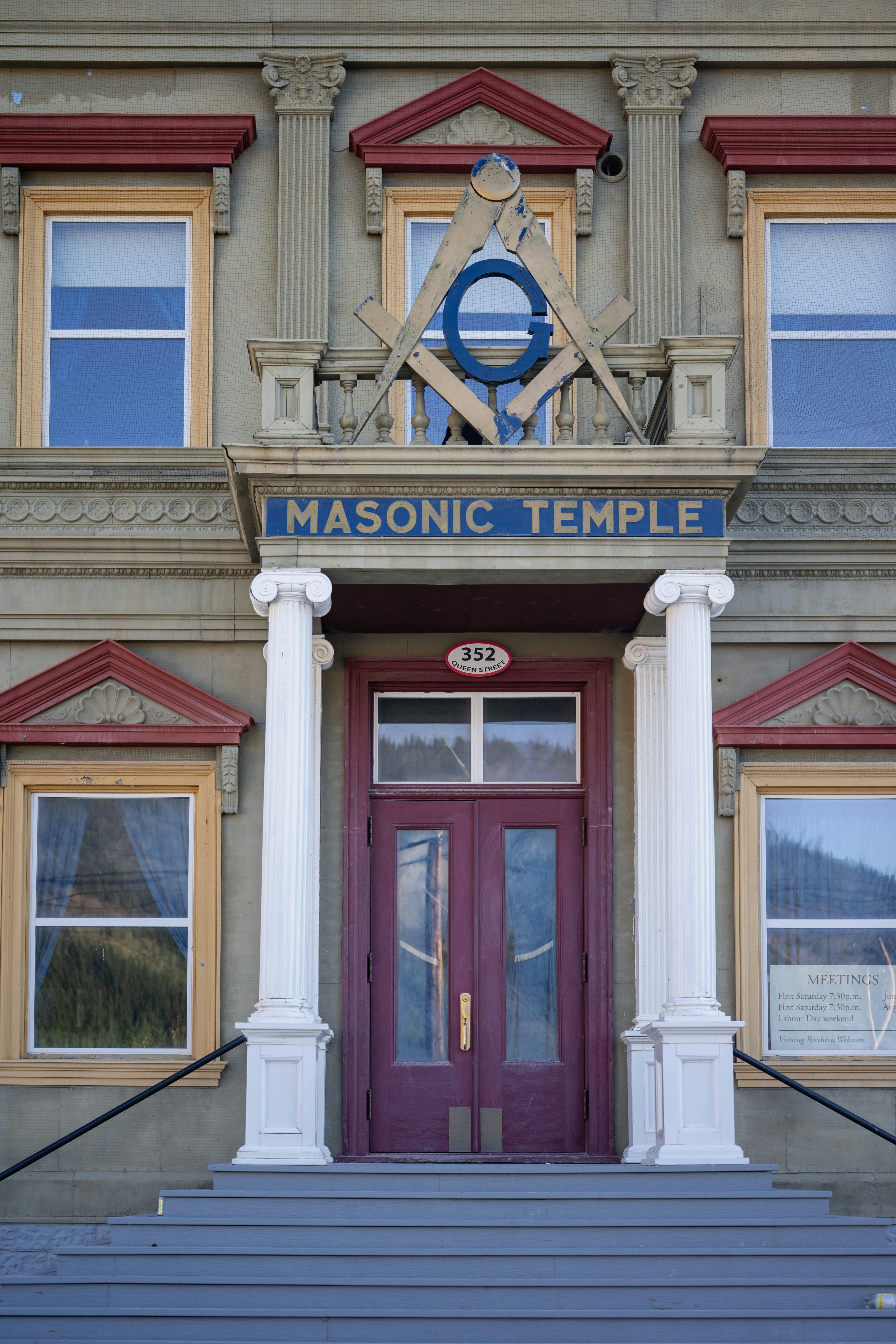 The image shows the entrance of a masonic temple.