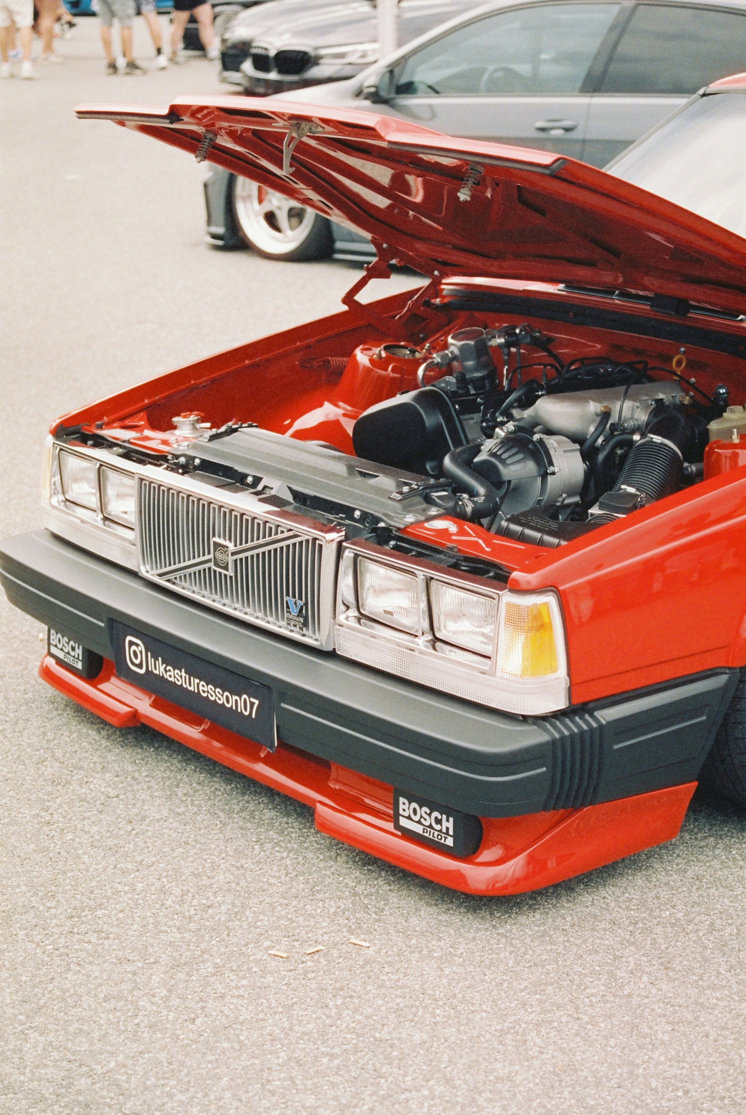 A modified volvo's engine bay is shown. photo – Free Film photography ...