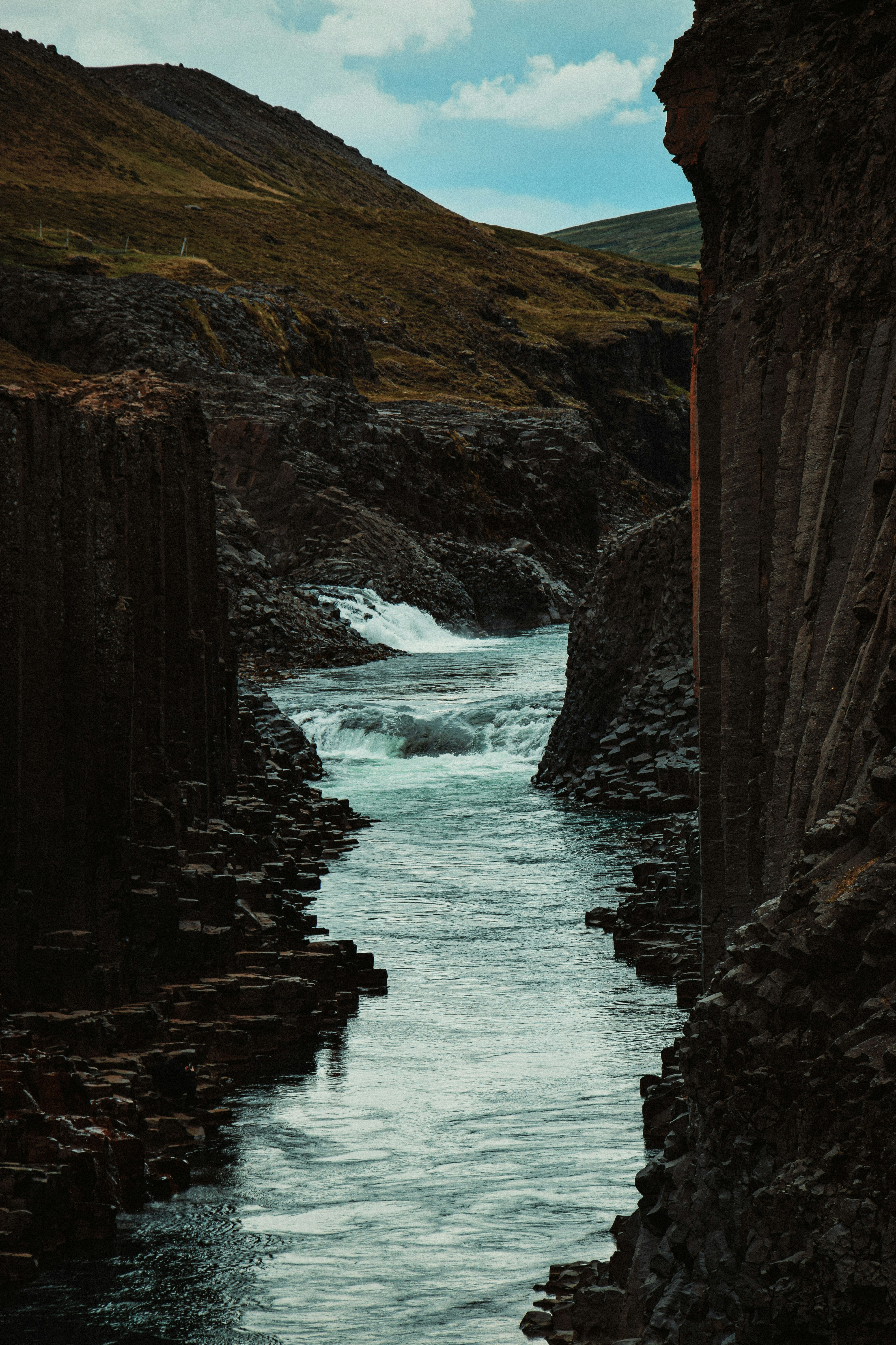 A river flows through a rocky gorge.