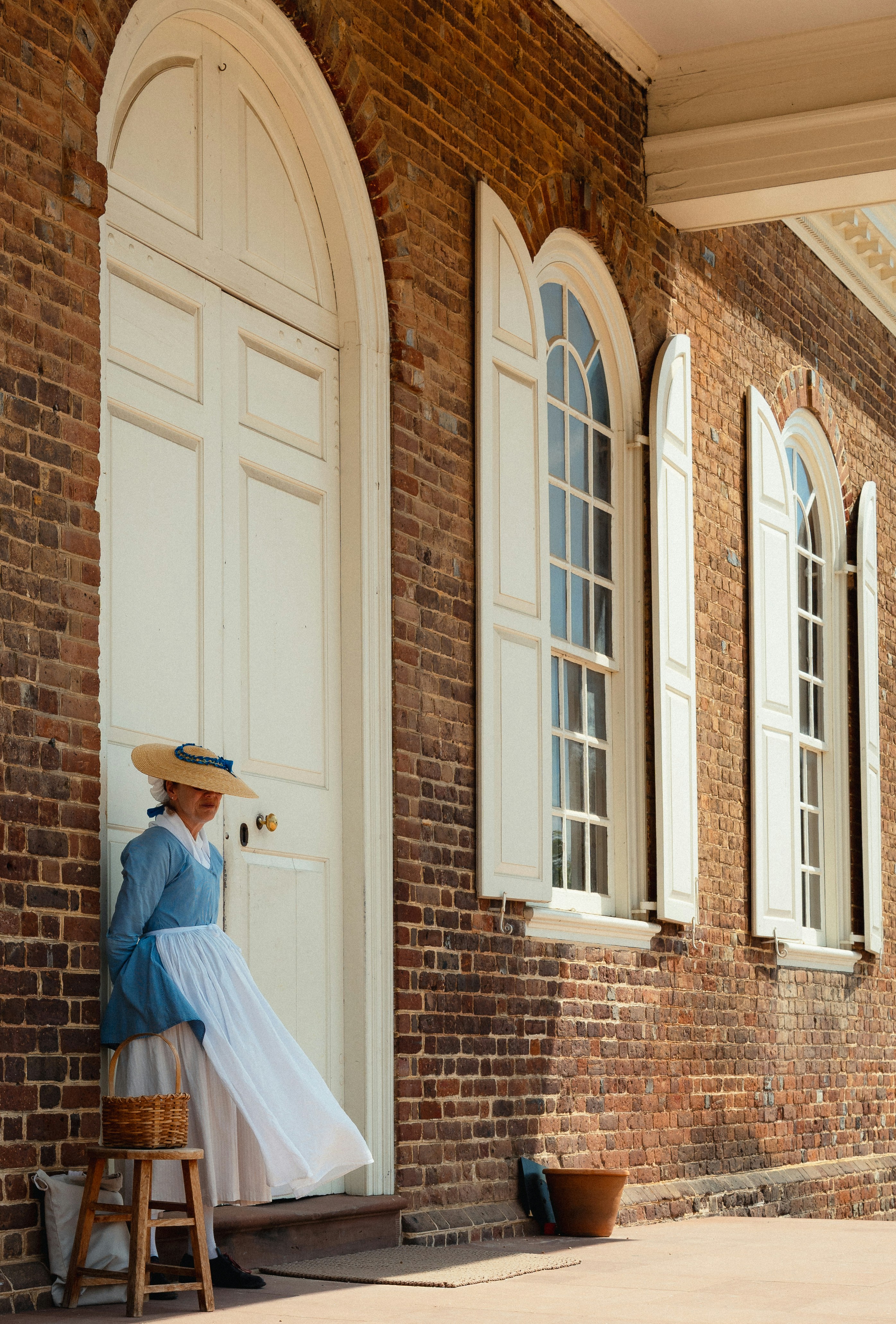 Quiet Grace at a Sunlit Brick Veranda