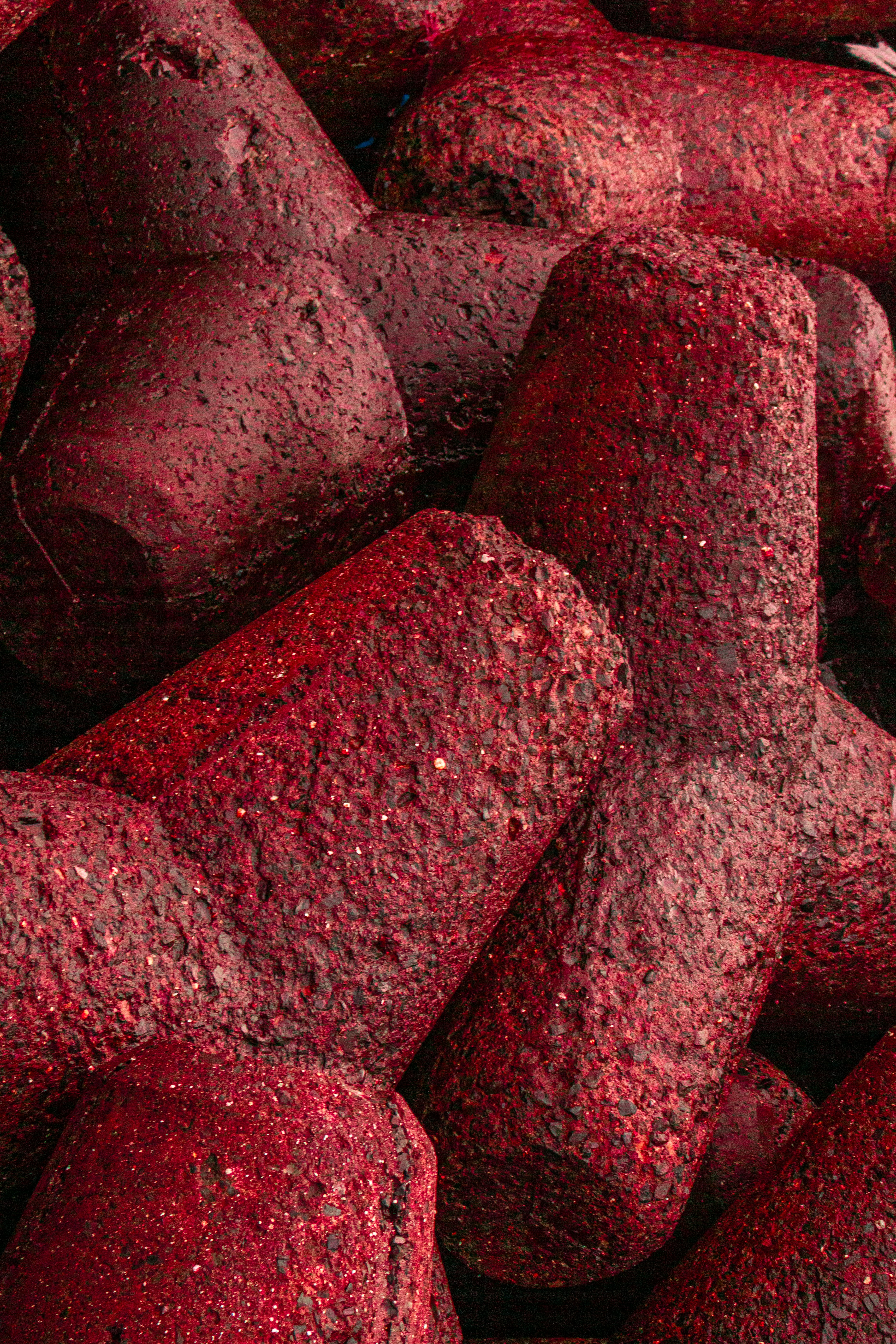 Crimson Cast: A Close-Tangle of Coated Granules