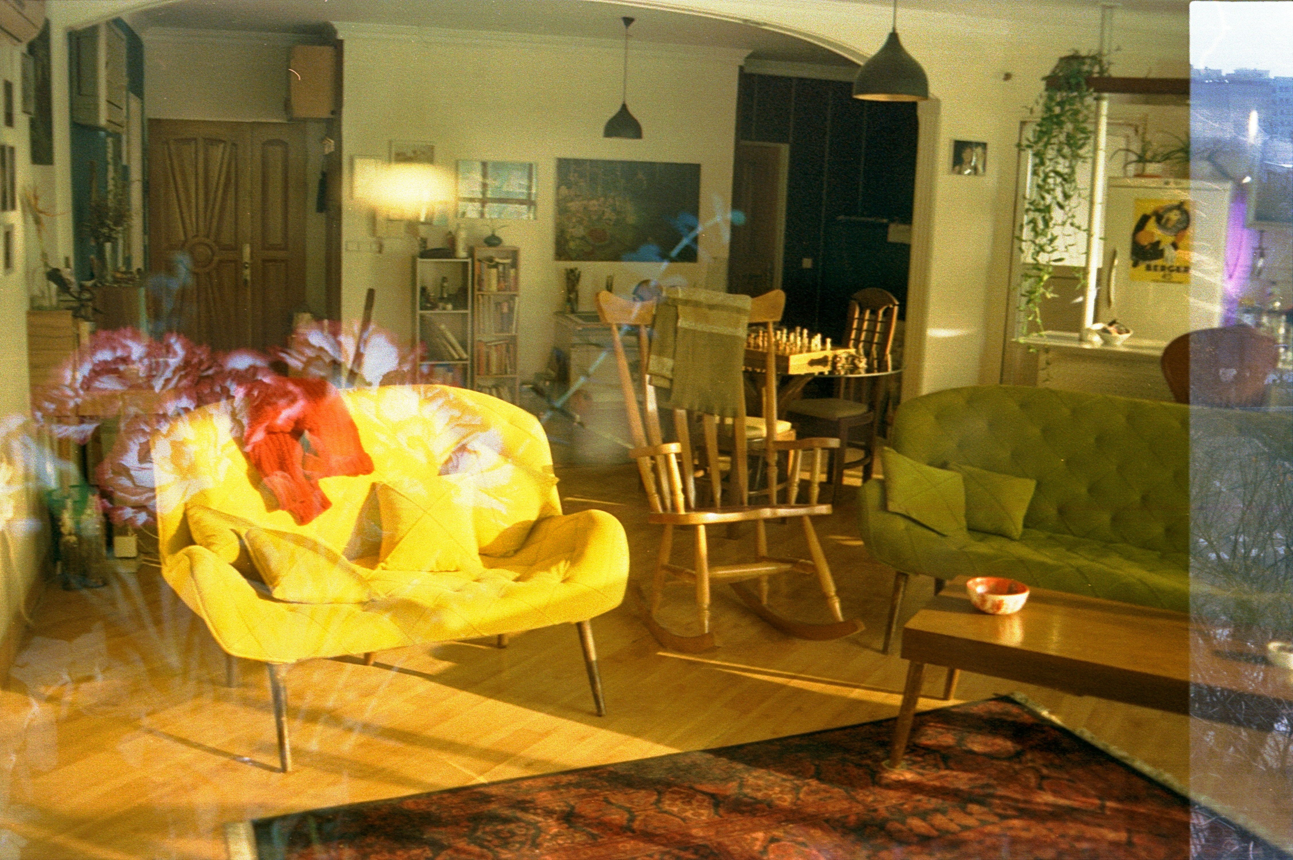 A cozy living room with yellow accents.
