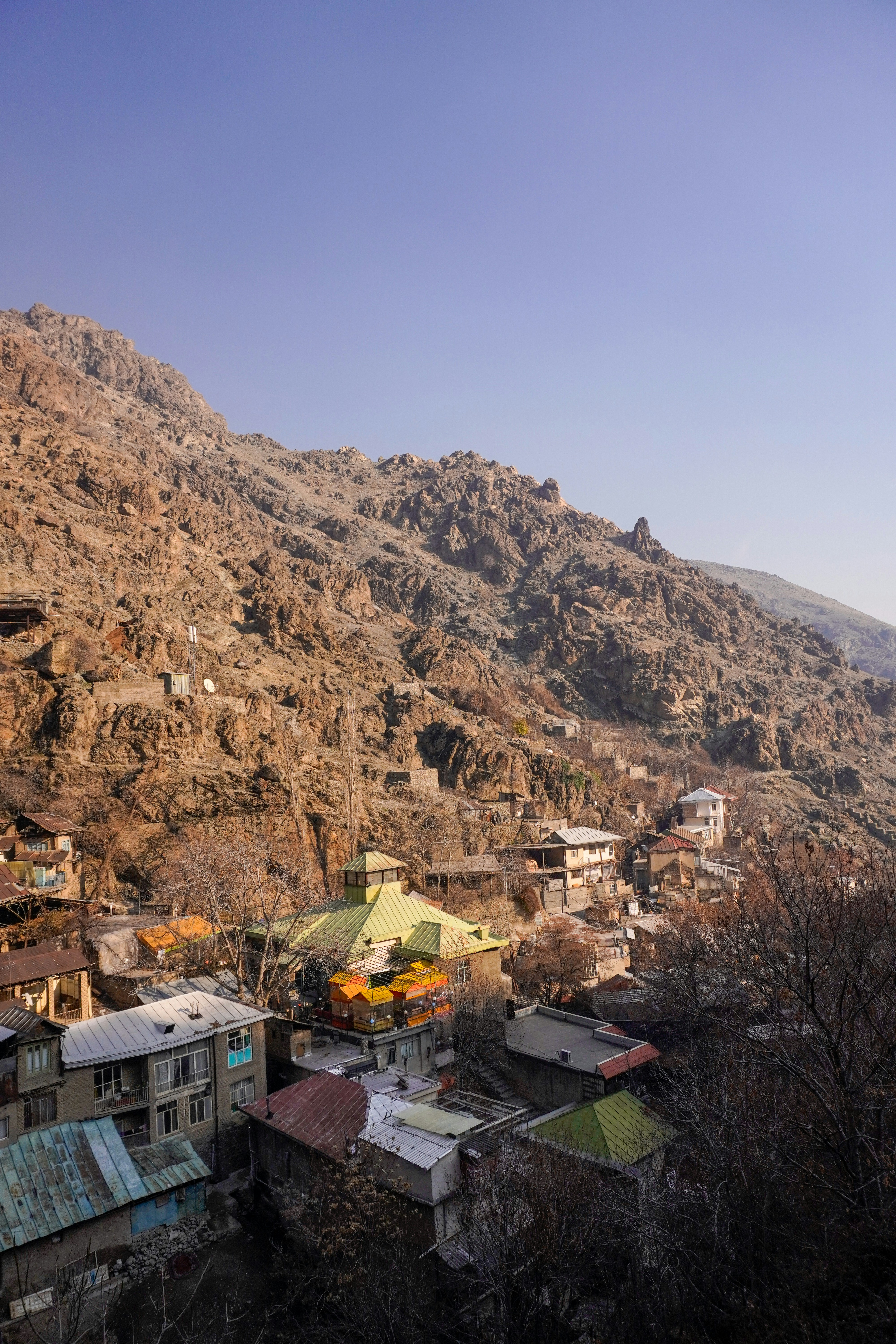 A village nestled between mountains.