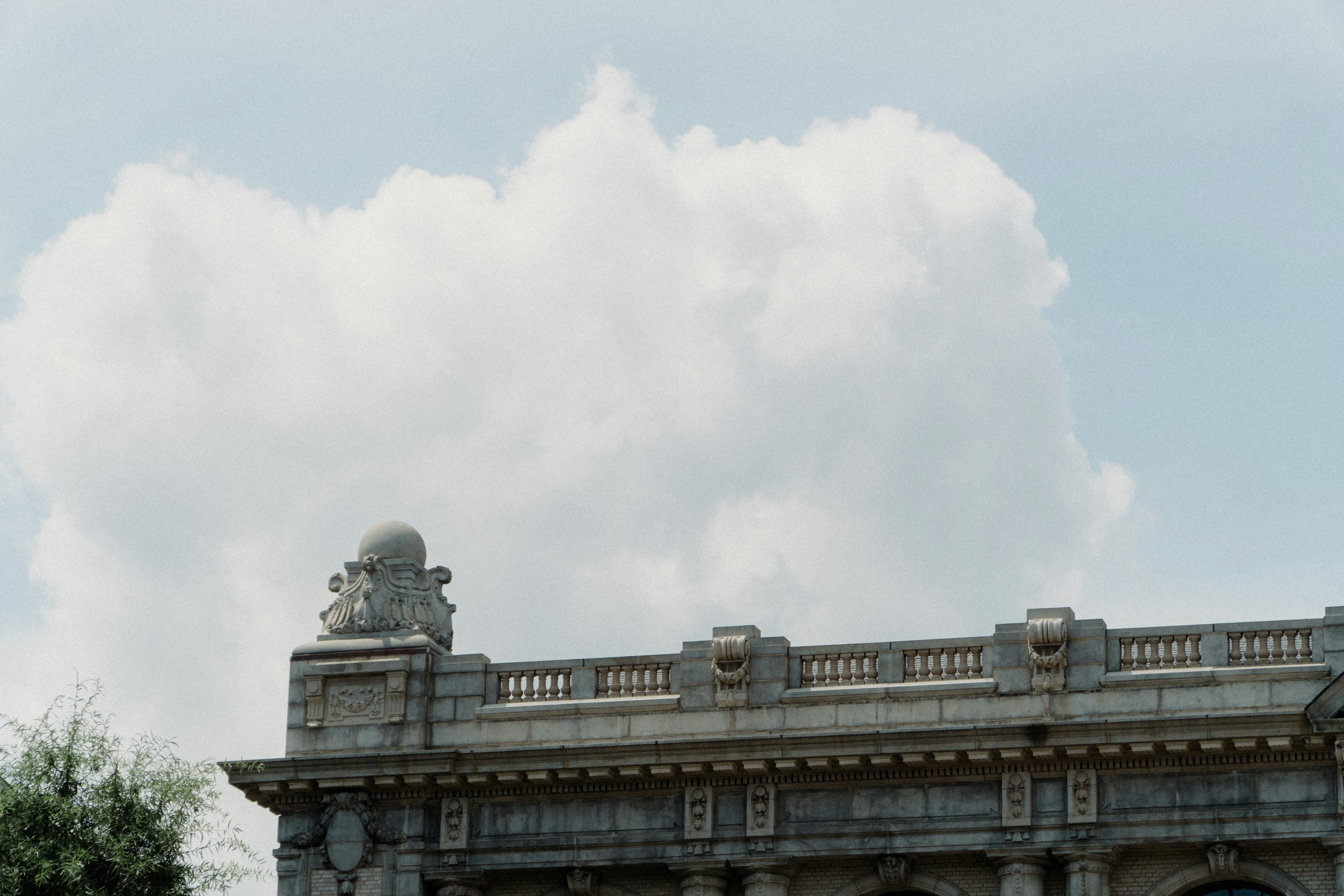 Building and cloud formation on a bright day.