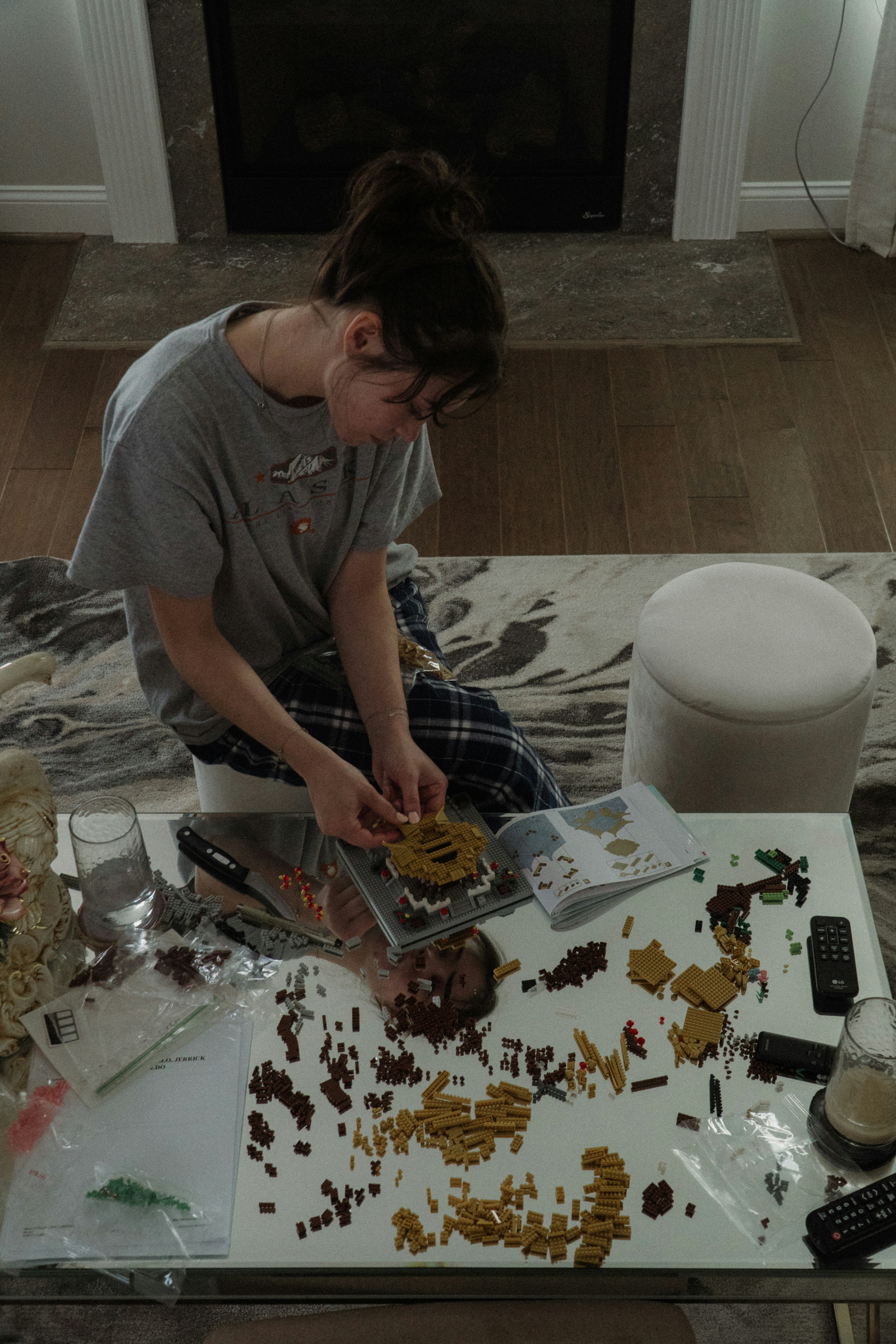 Mid-Session LEGO Mosaic: A Cozy Indoor Build on a Glass Table