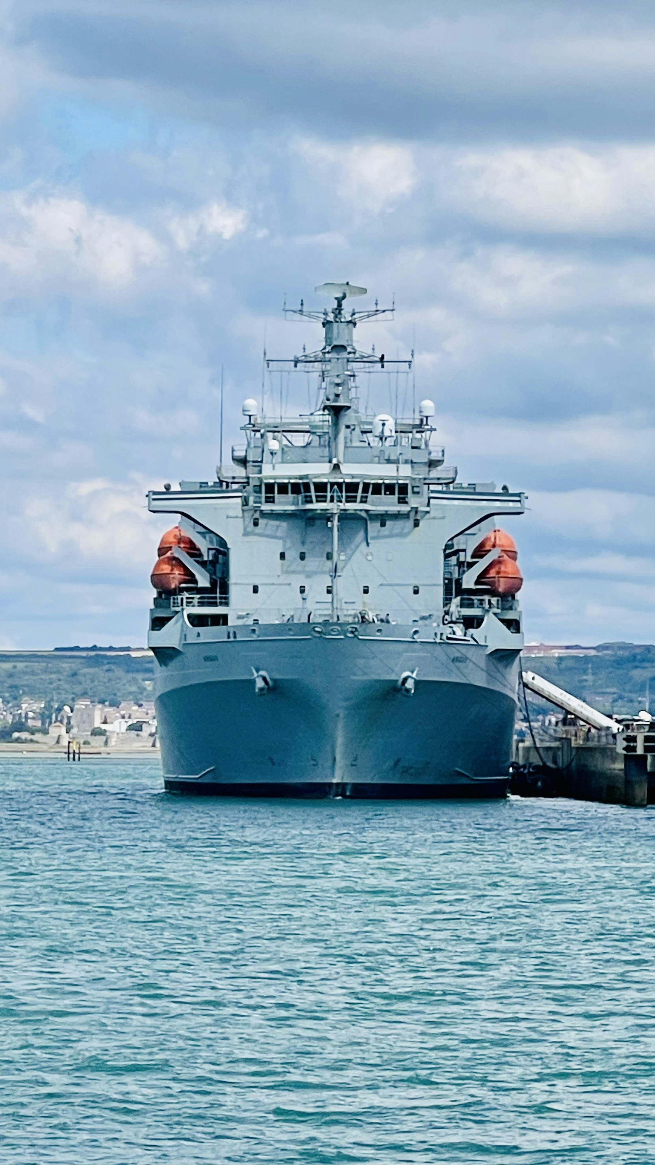 Nautical Majesty: A Naval Vessel's Dockside Presence