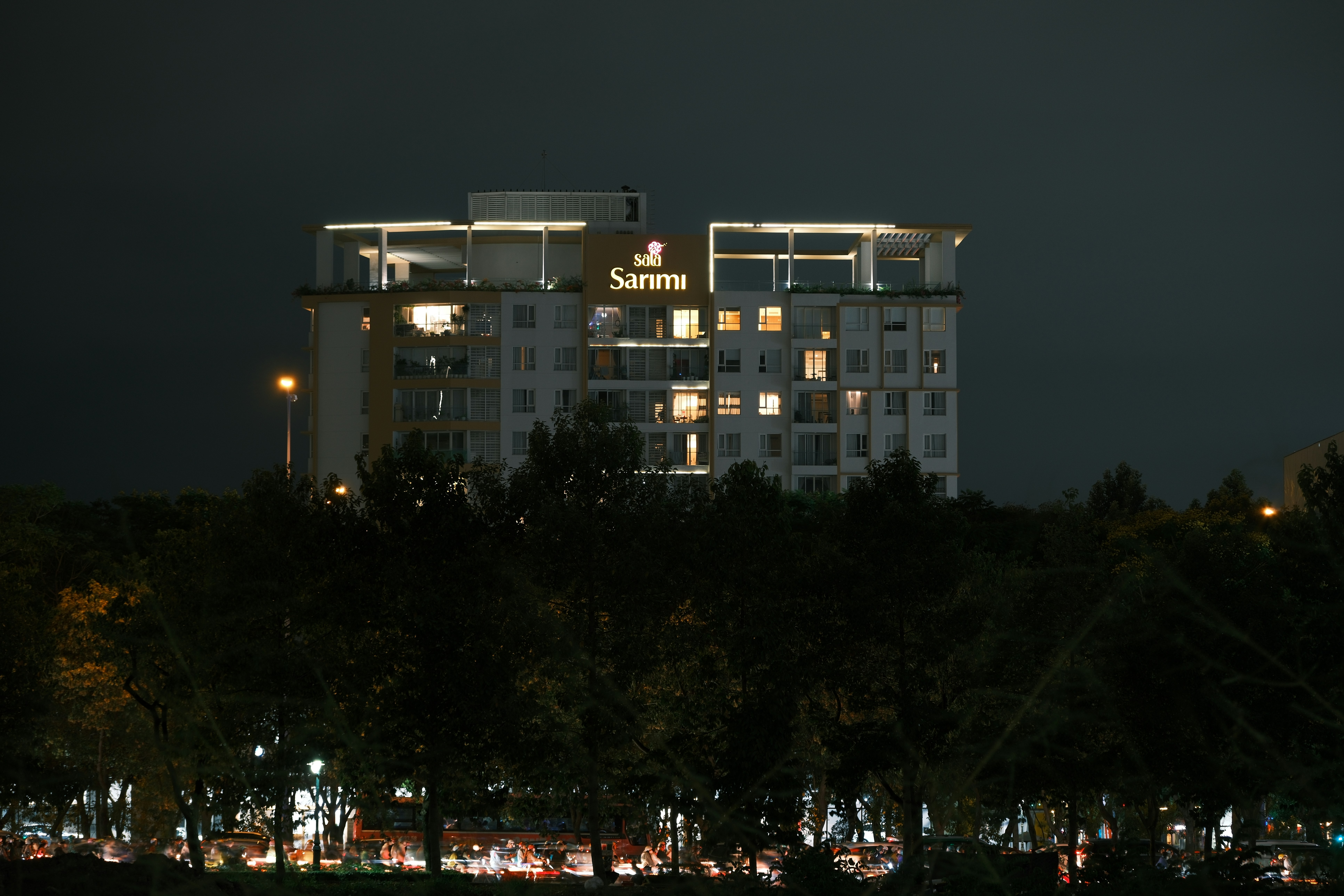 Illuminated building at night, with lights.