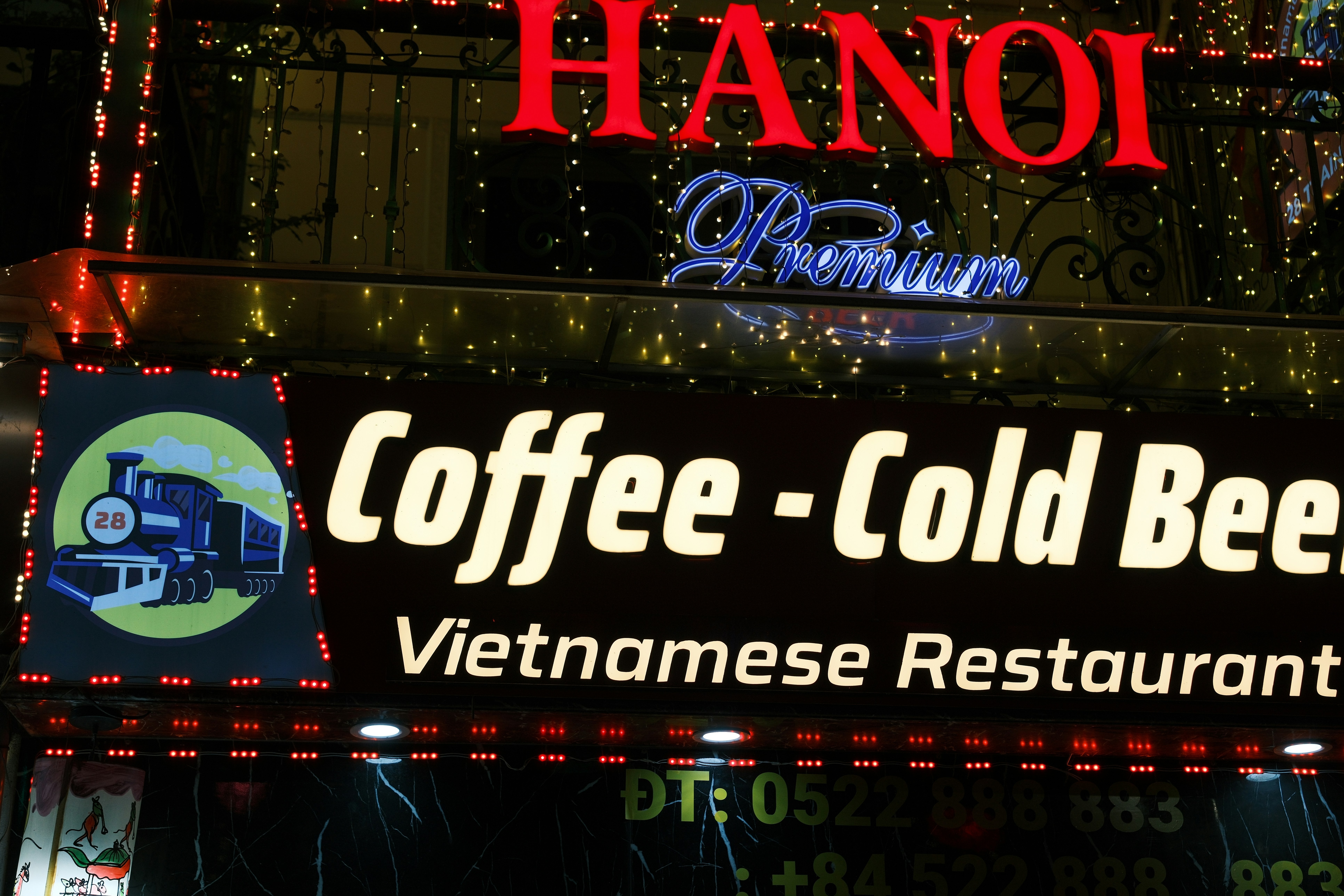 Neon Ledger of Hanoi: Coffee and Cold Beer in Neon Night
