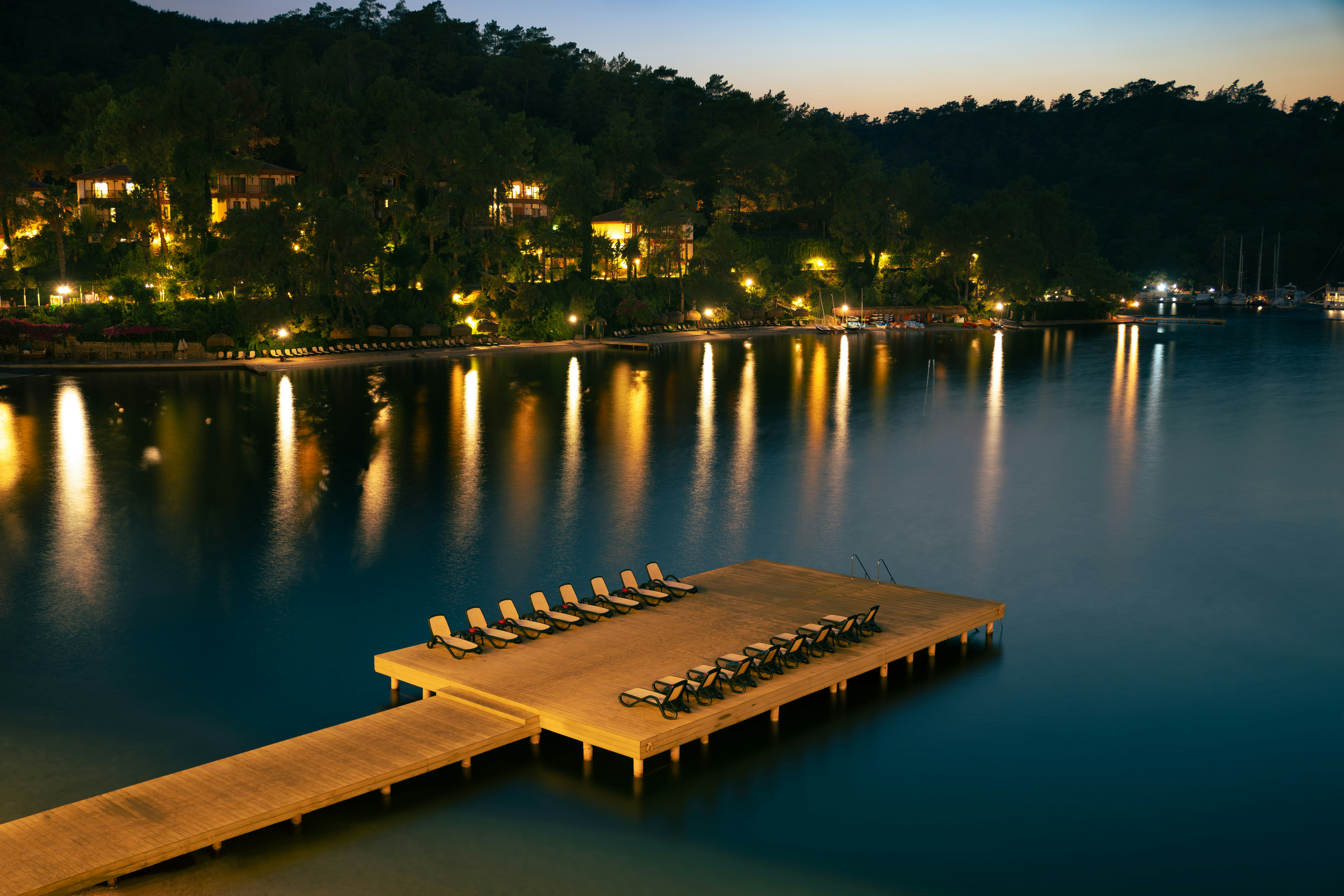 Tranquil Evening Reflections by the Dock
