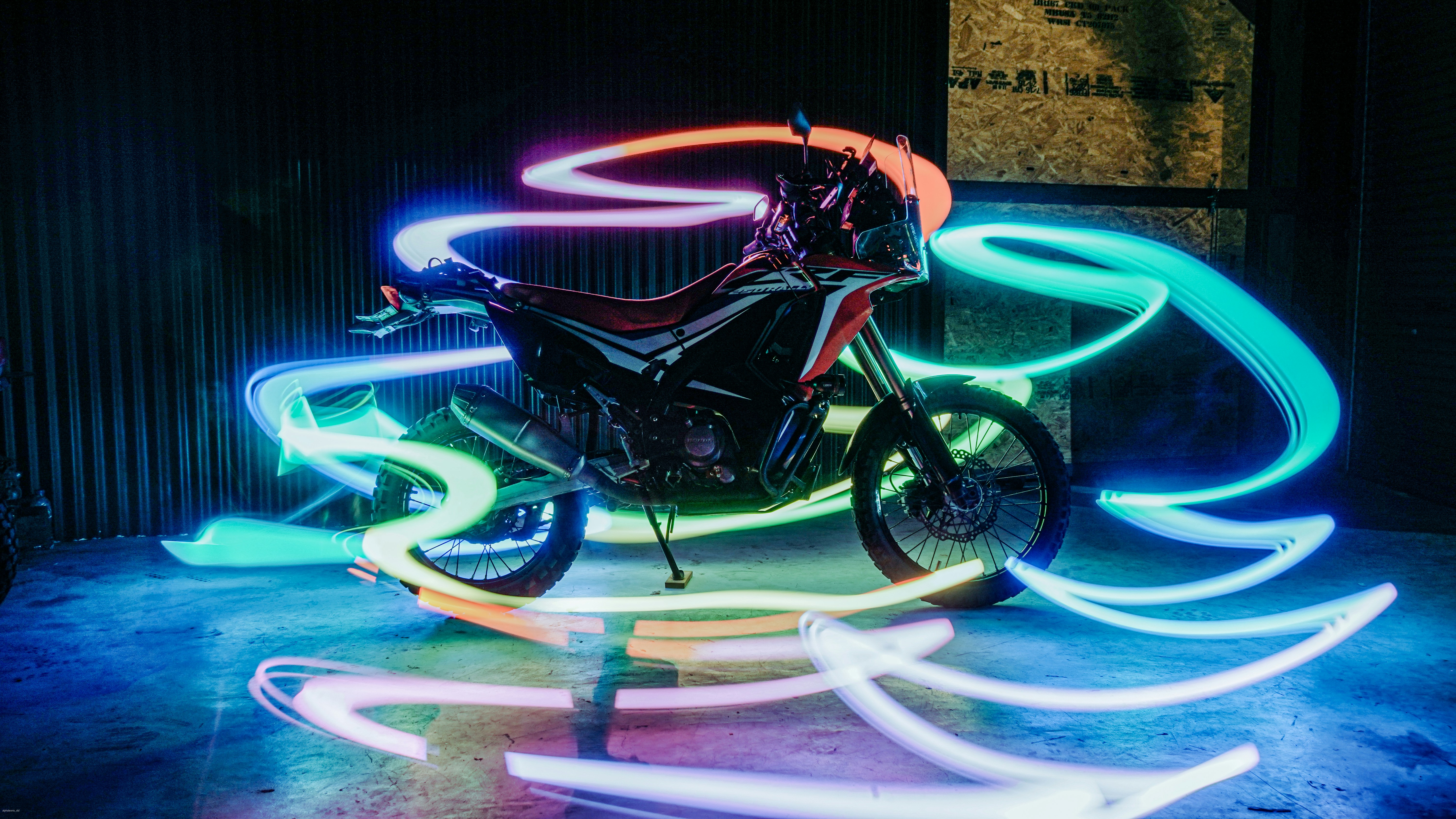 Neon Whorls Embrace a Midnight Moto in Motion