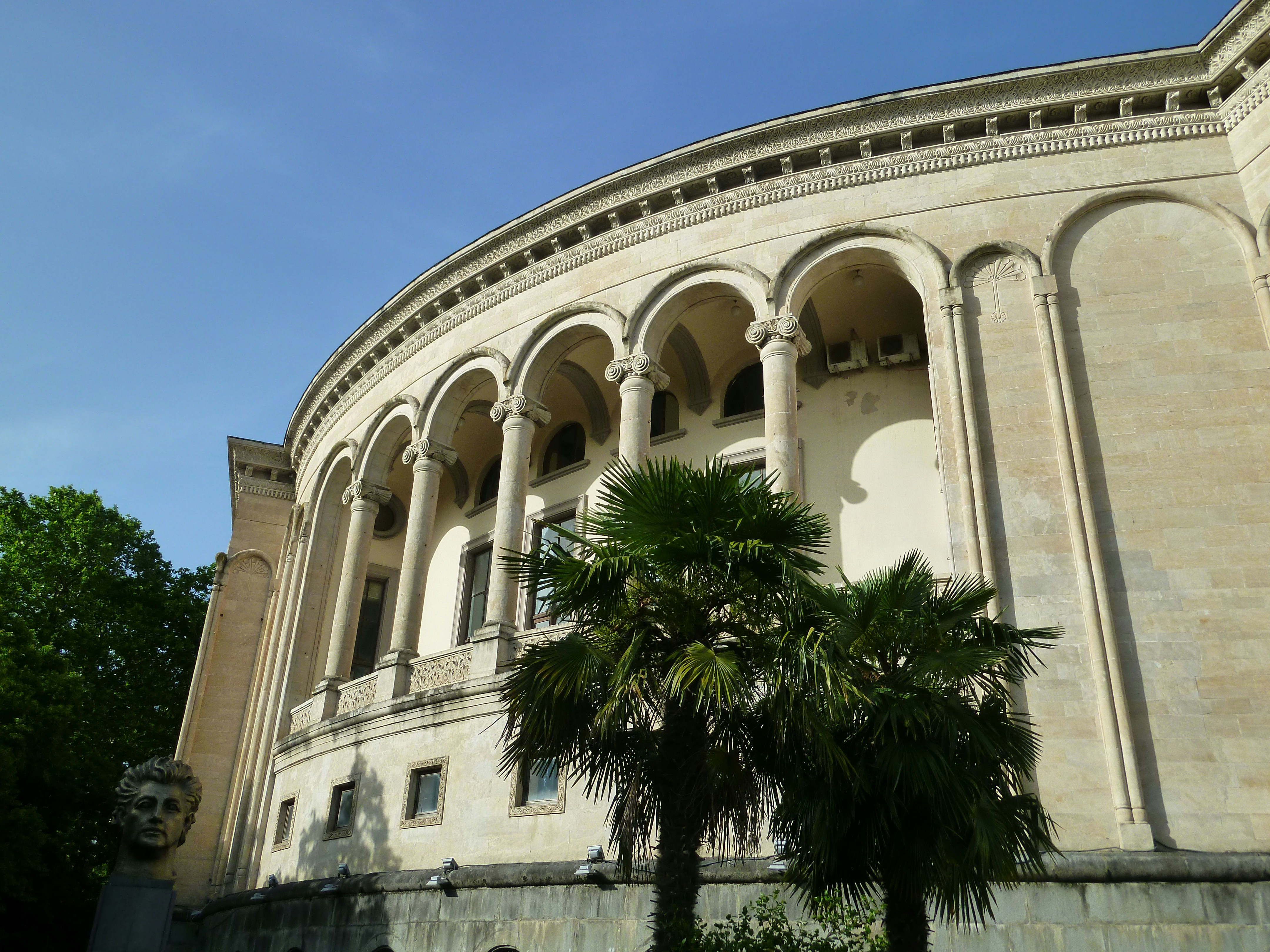 A beautiful, ornate building under a blue sky.