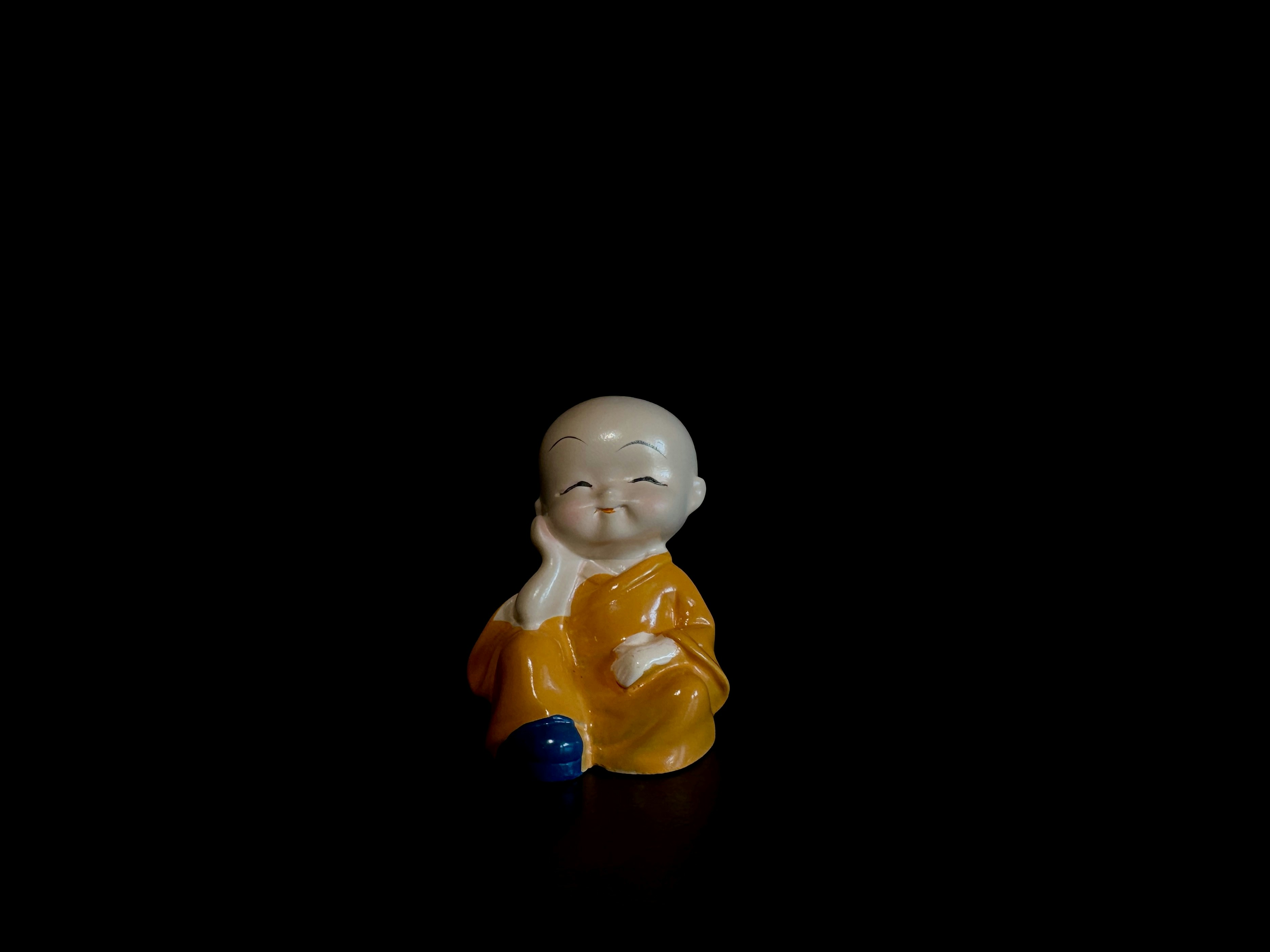 Contemplative Serenity: A Porcelain Monk's Delight