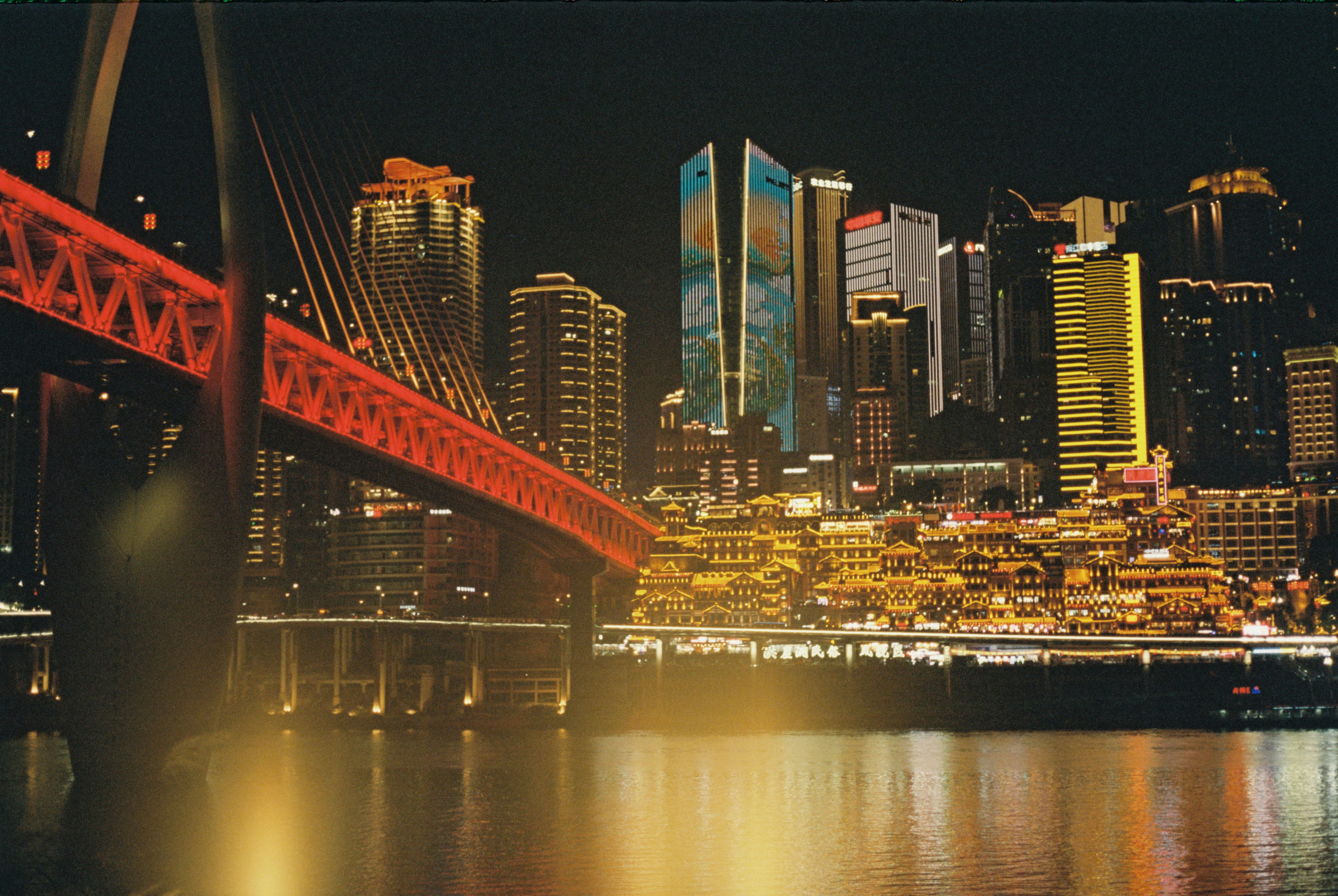 City skyline lit up at night.