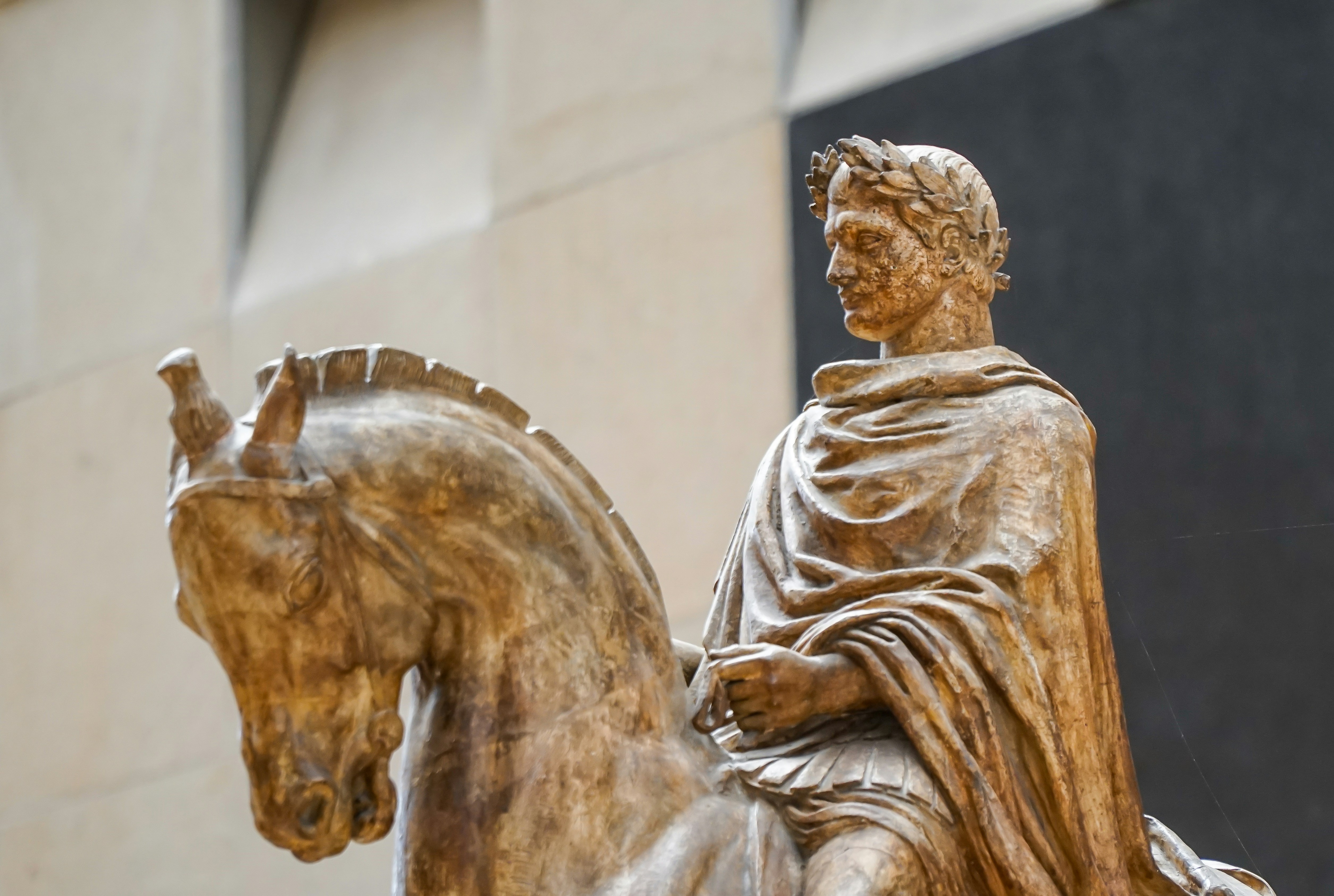 A sculpture depicts a man on horseback.