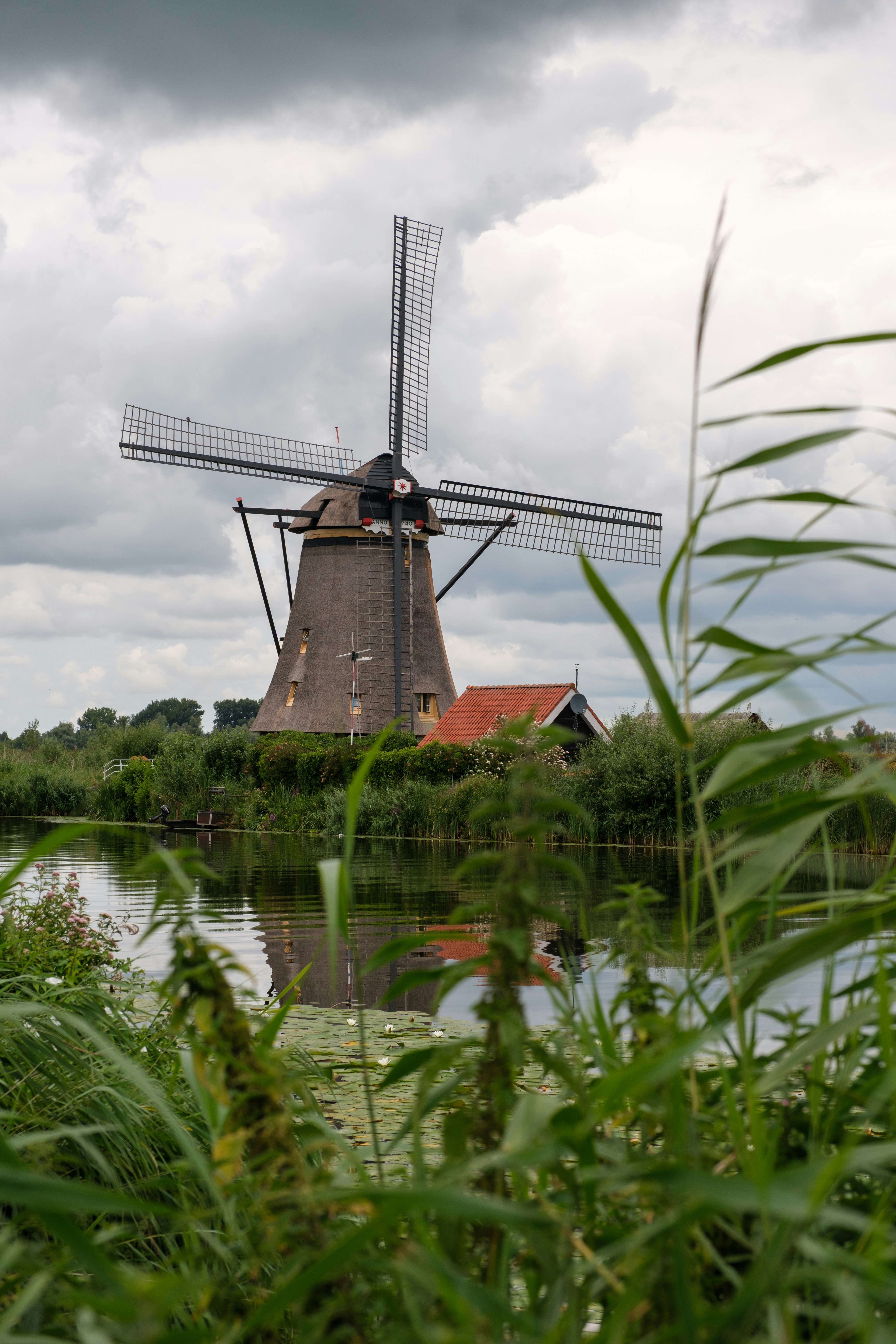 Whispers of the Windmill: A Tranquil Reflection
