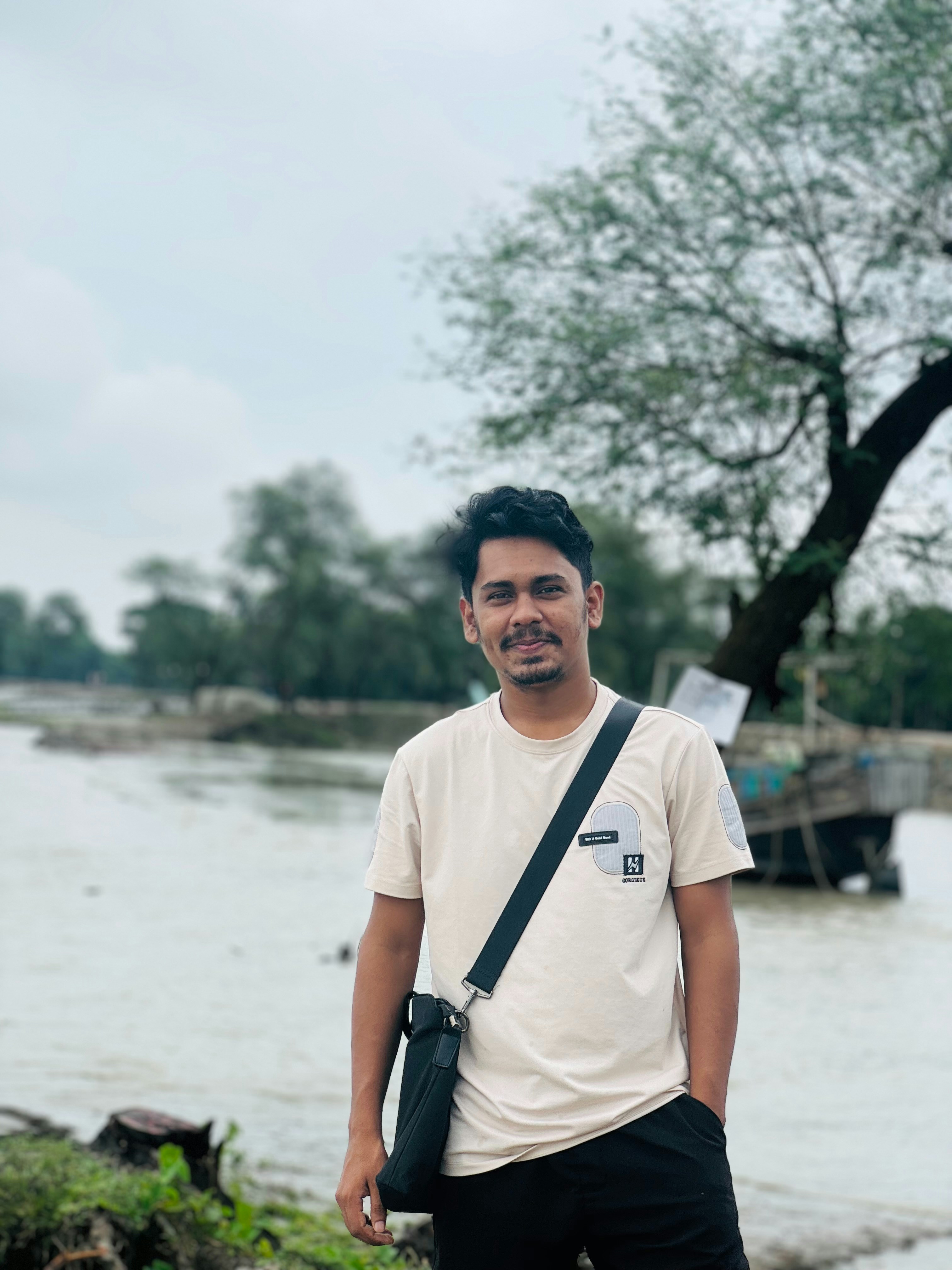 Riverside Portrait: Quiet Confidence Under Dappled Light