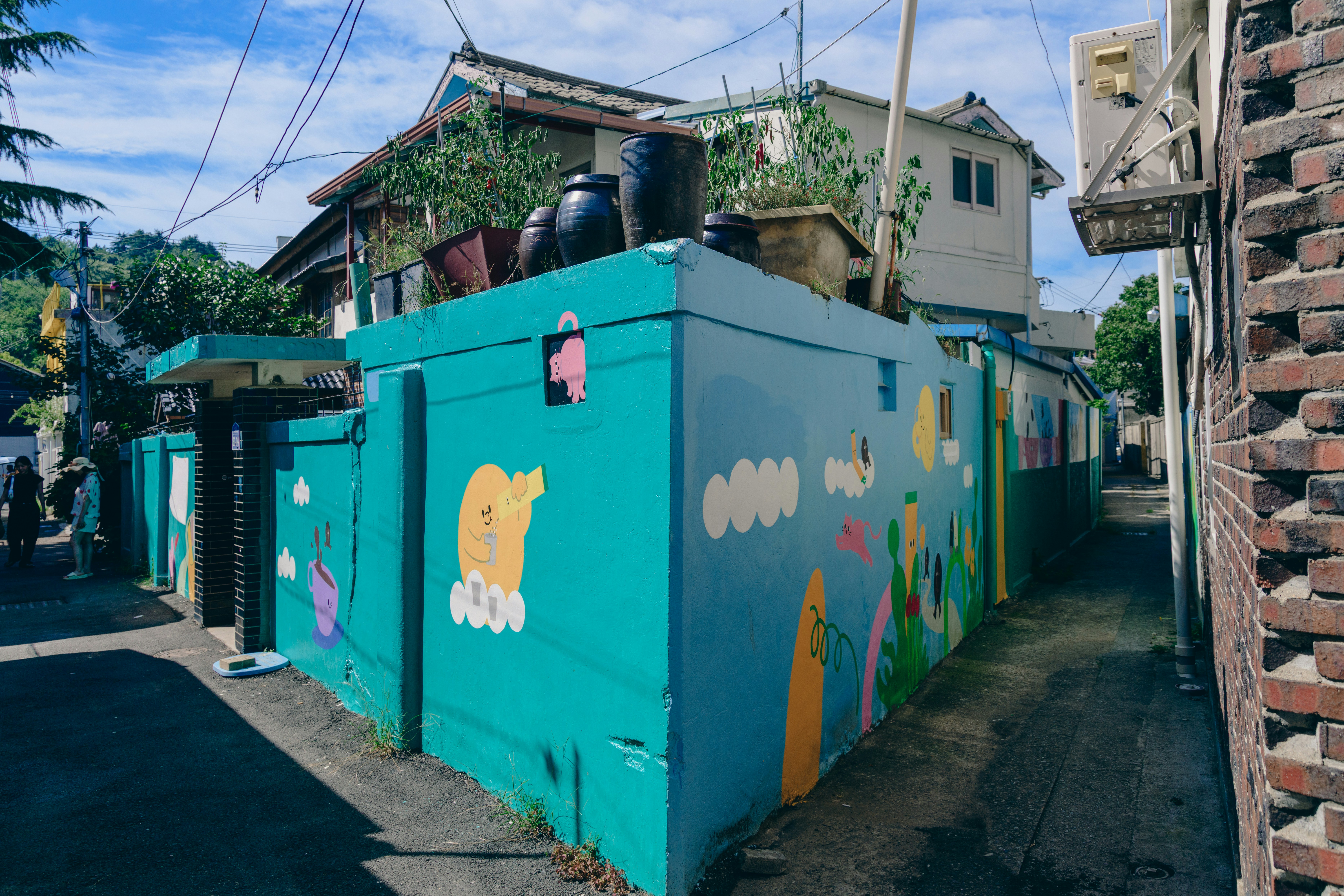 Whimsical Alleyway of Colorful Murals