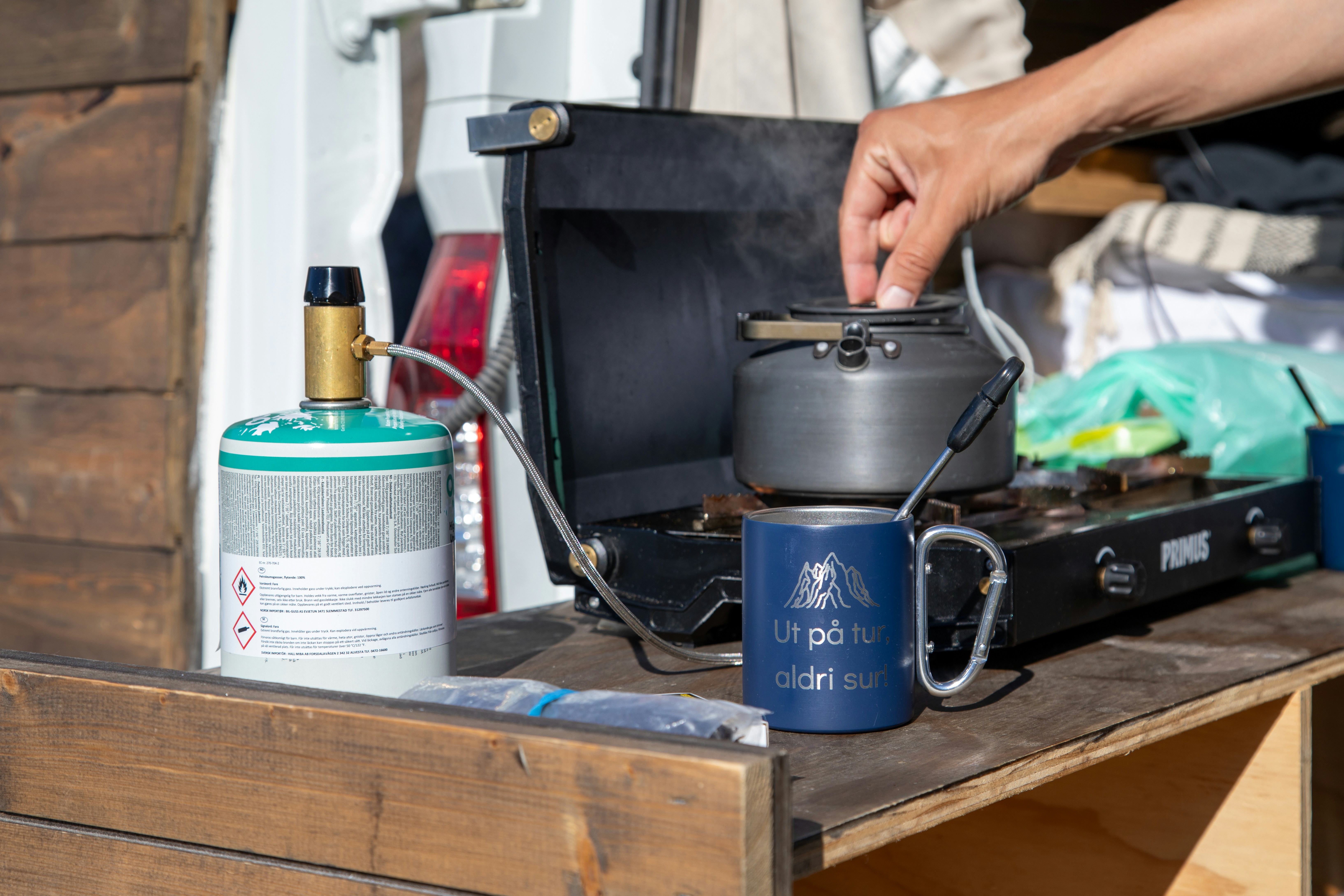 Hand on the Knob: A Rustic Camp Kitchen Moment
