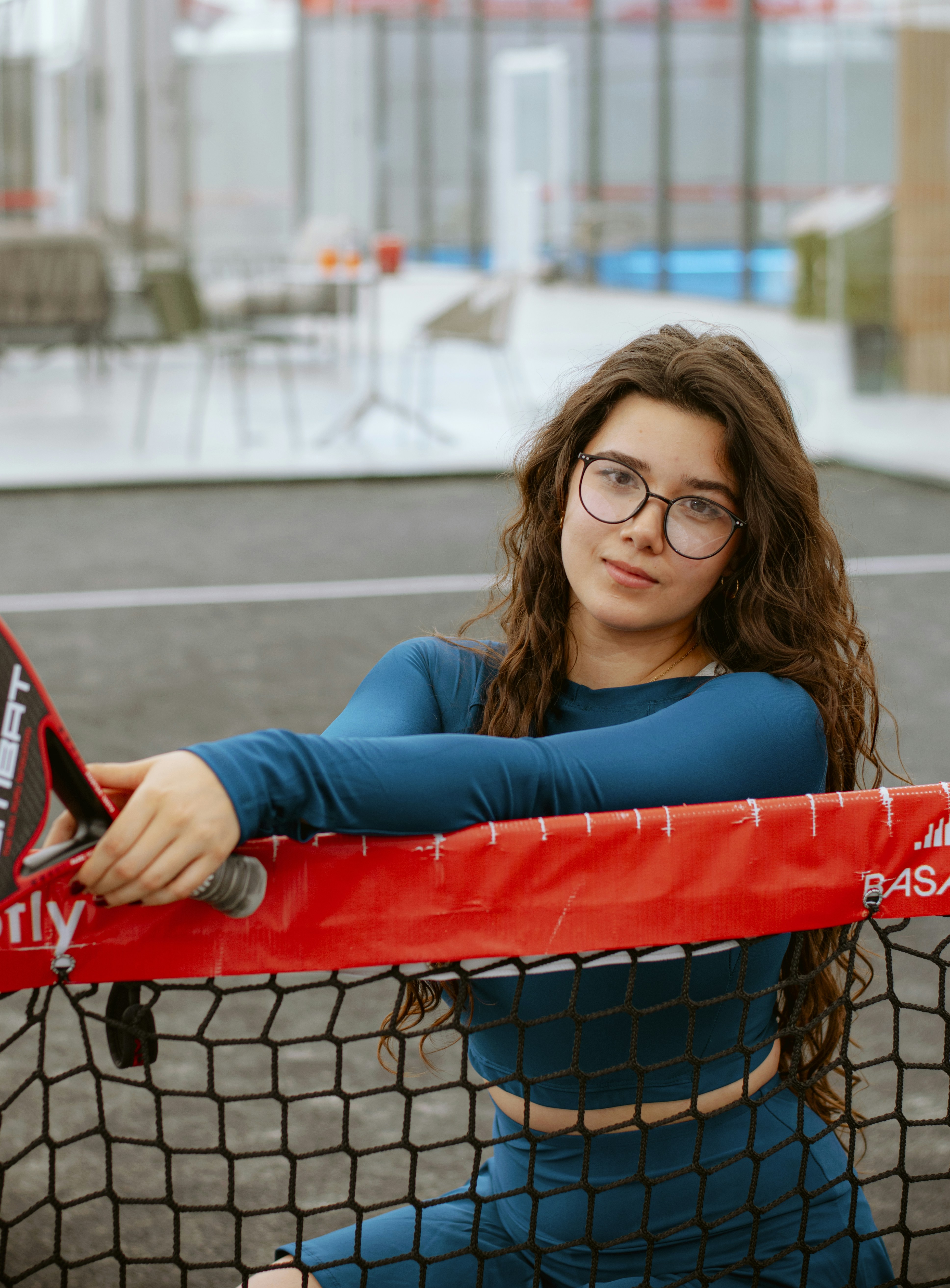 Glassy Eyes and Net—A Calm Moment at the Net