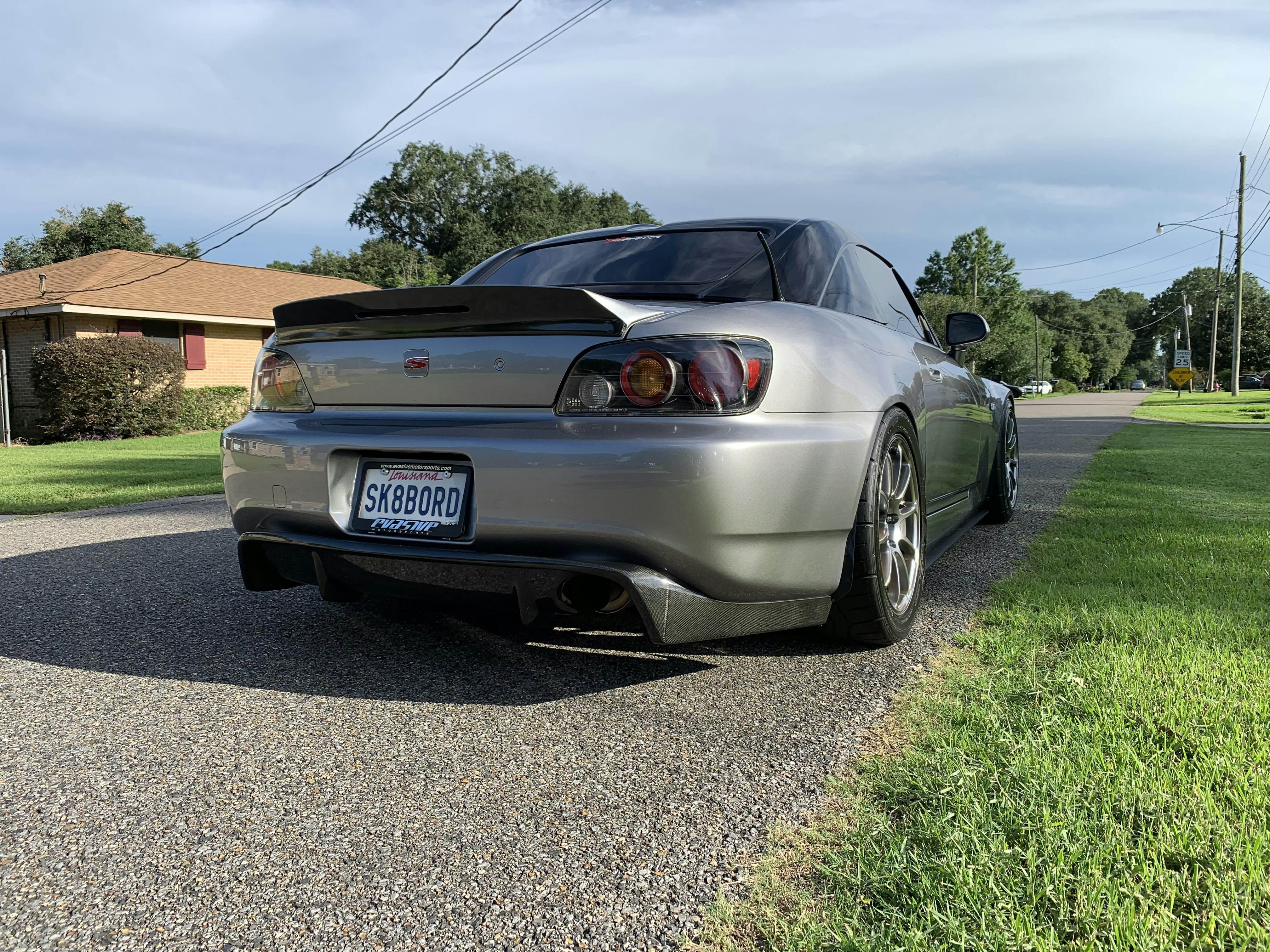 Elegance in Motion: A Silver Sports Car Profile
