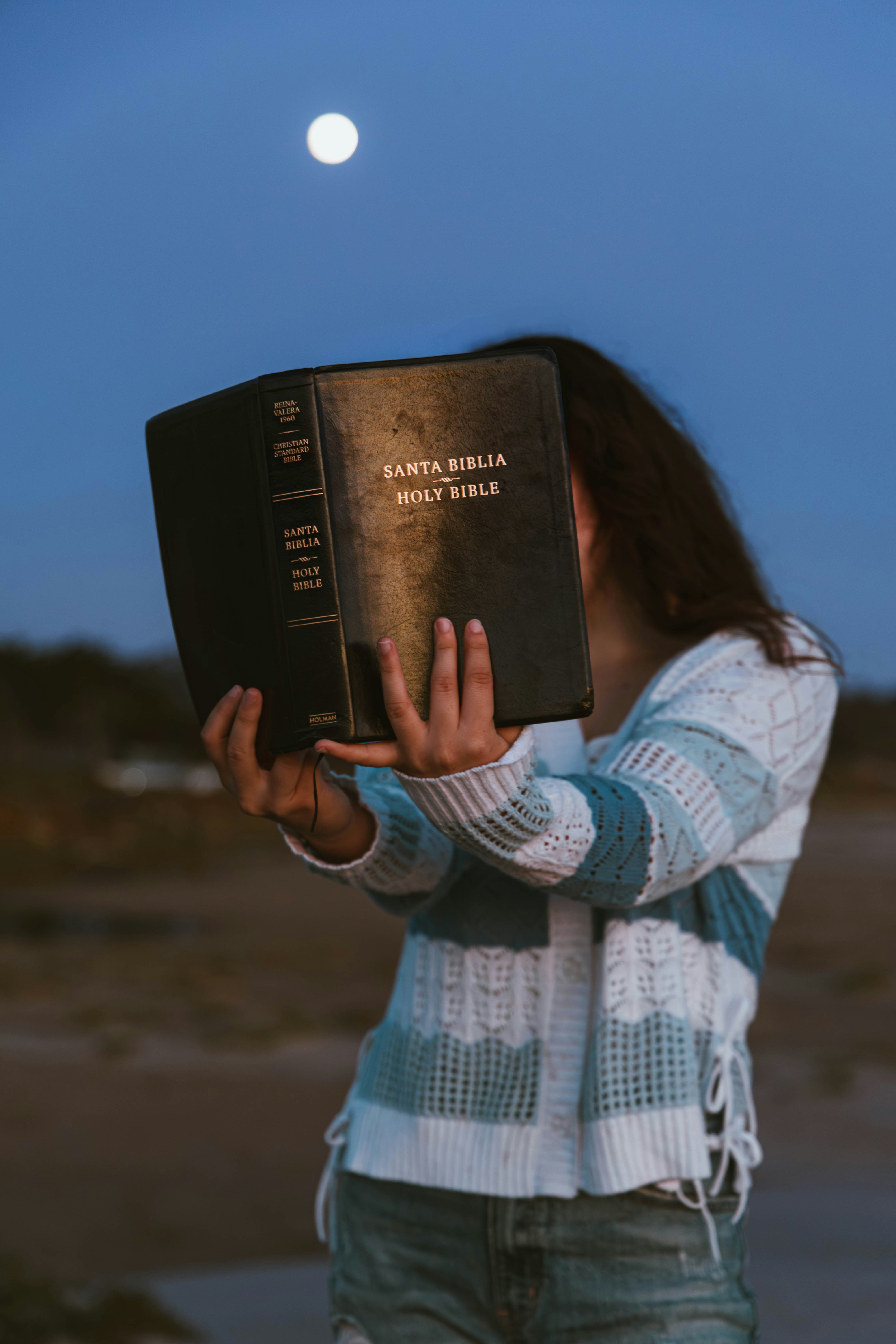 Illuminated Reflections: A Moment of Faith Under the Moon