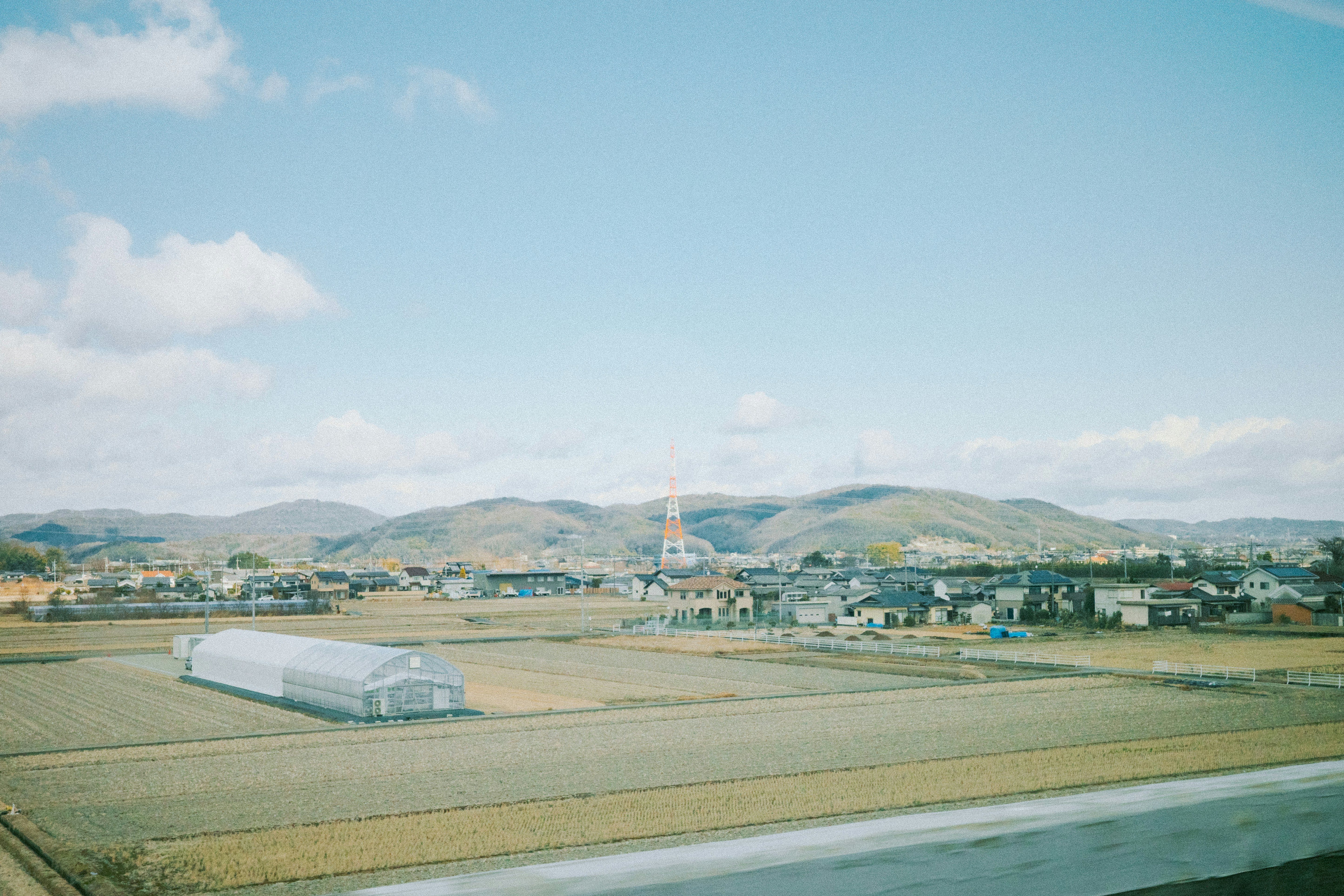 A rural town nestled amongst the hills.