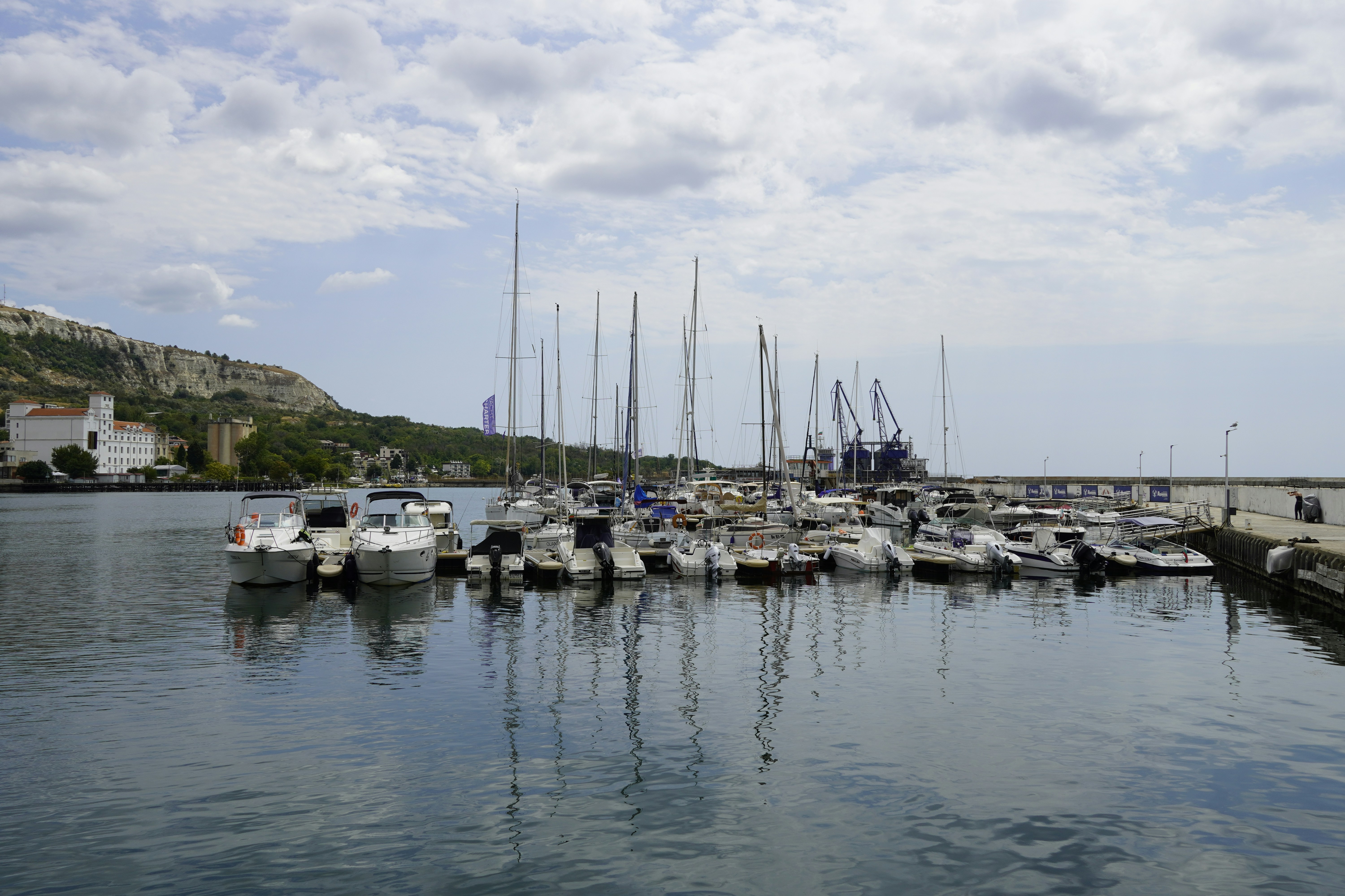 Balchik, Bulgaria | Boats are docked in a calm harbor.