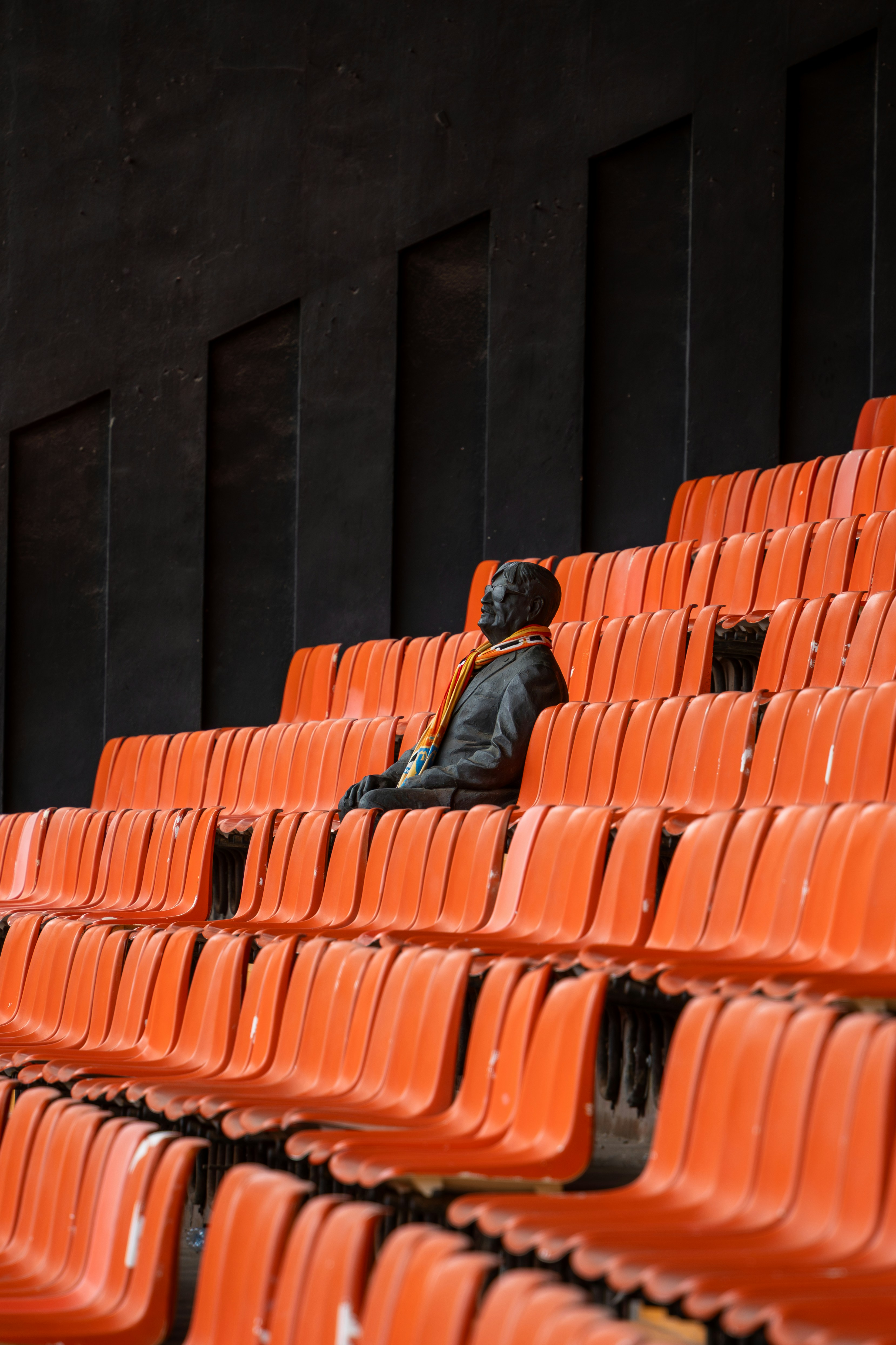 Estadio Mestalla, Valencia, Spain | A statue sits alone in an empty stadium.