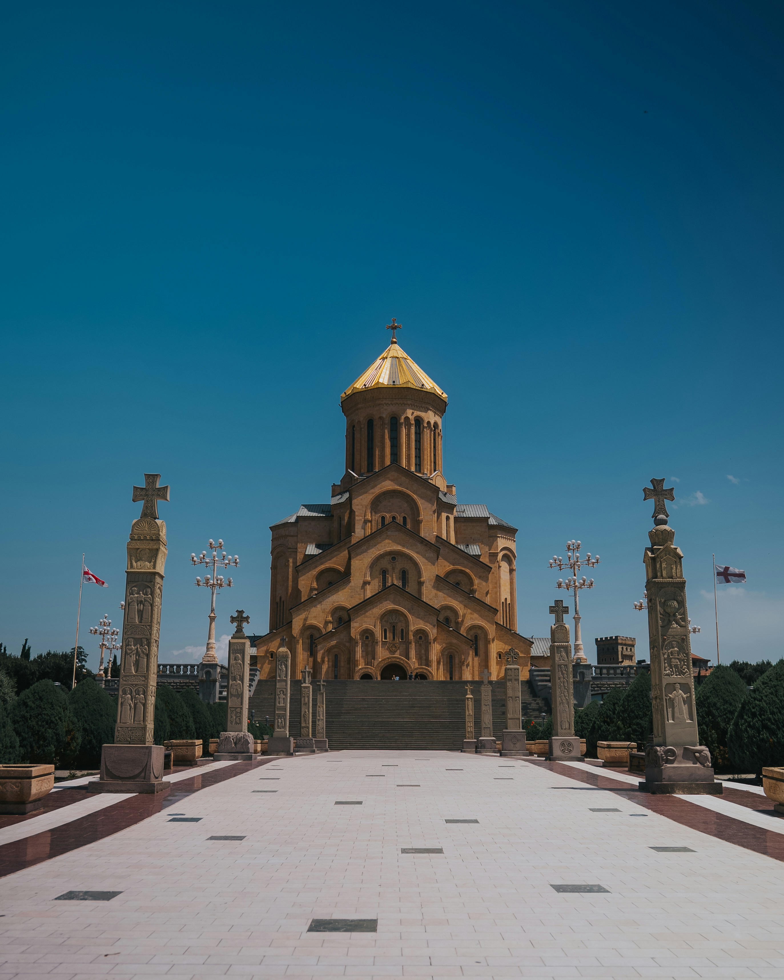A beautiful church stands proud under a blue sky.
