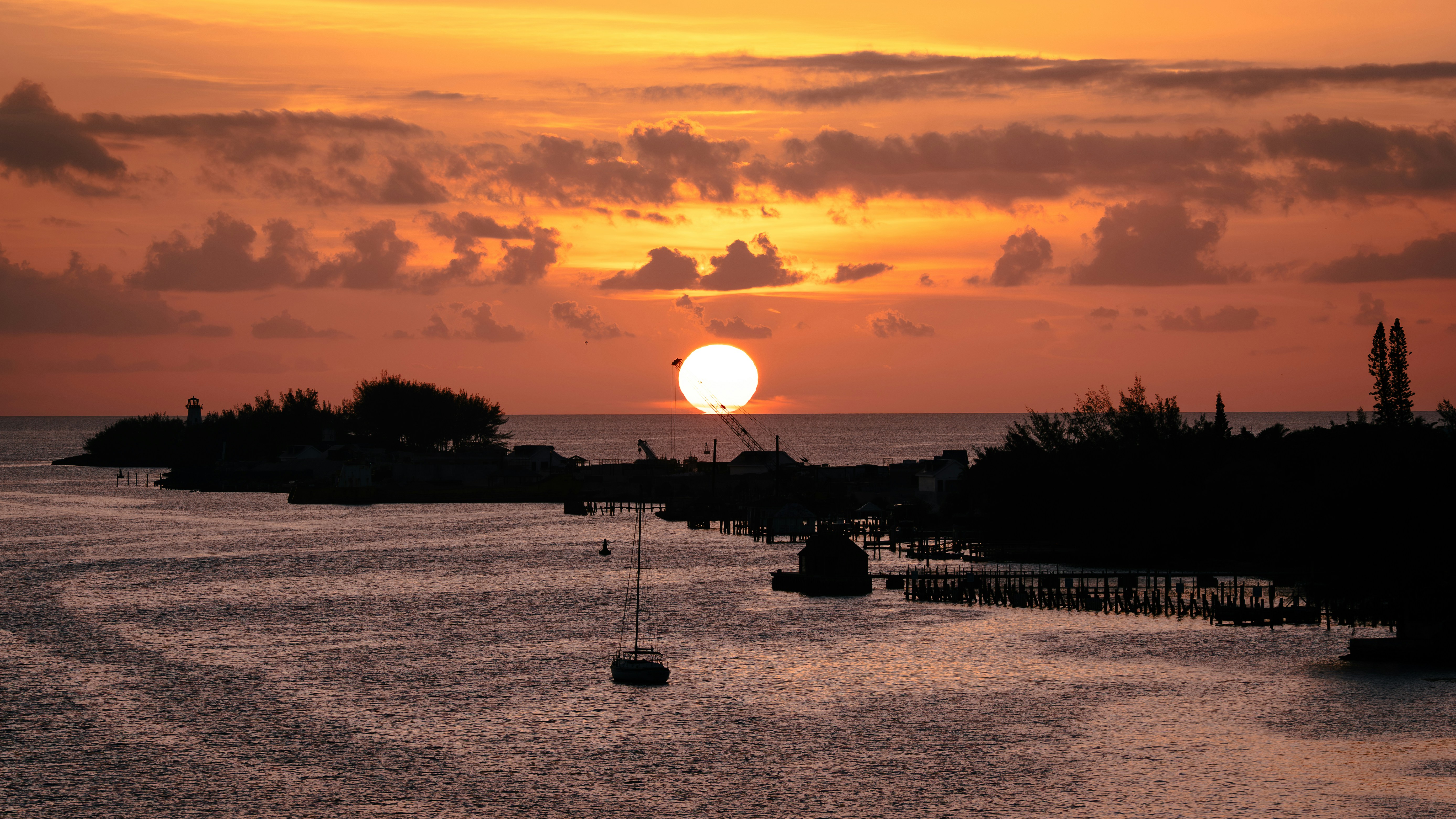Beautiful sunset over the ocean and silhouette.