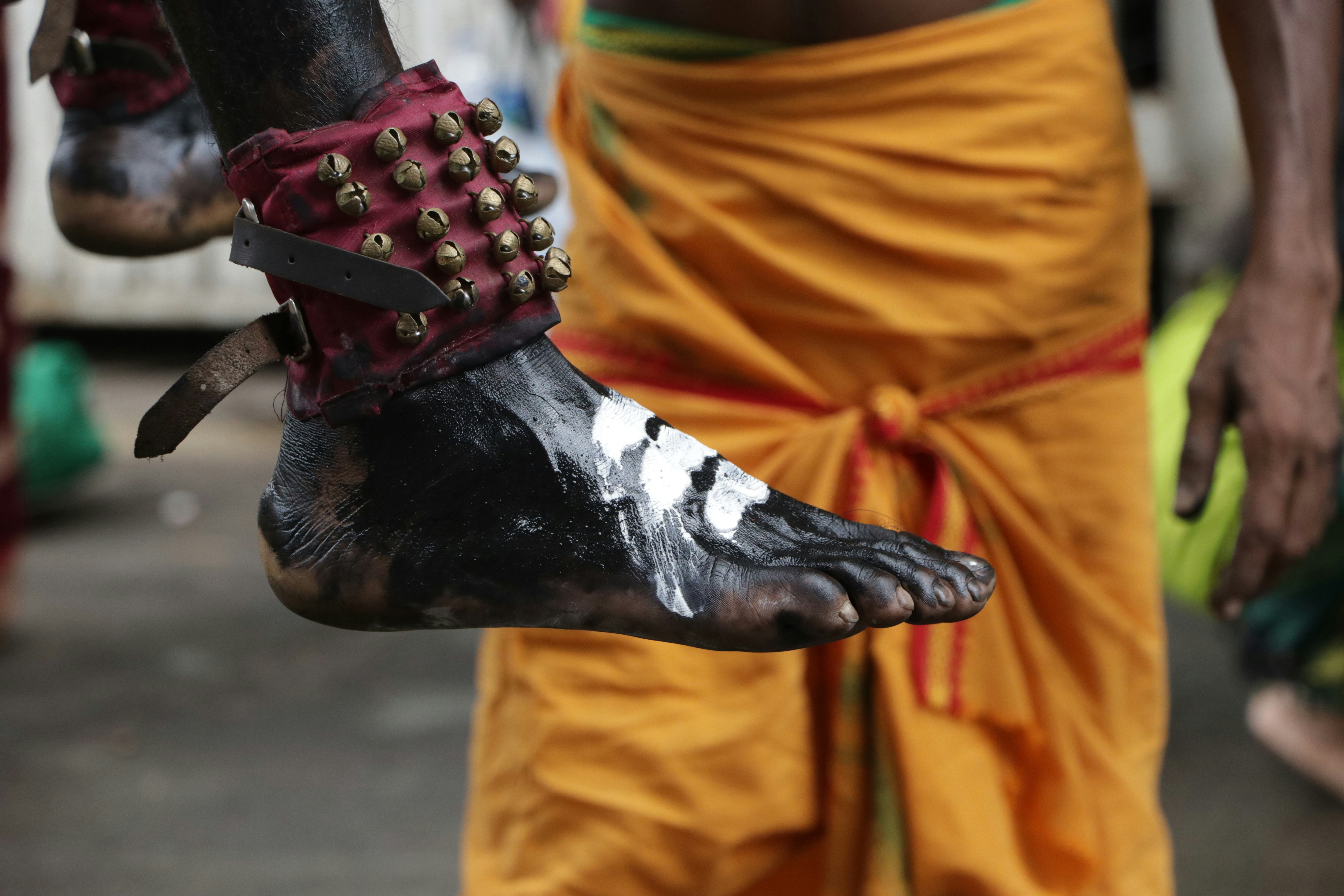 Annual Mayurapathi Amman Kovil - Sri Lanka, Colombo, VEL cart festival 2025. | Decorated foot with anklet, part of a religious practice.