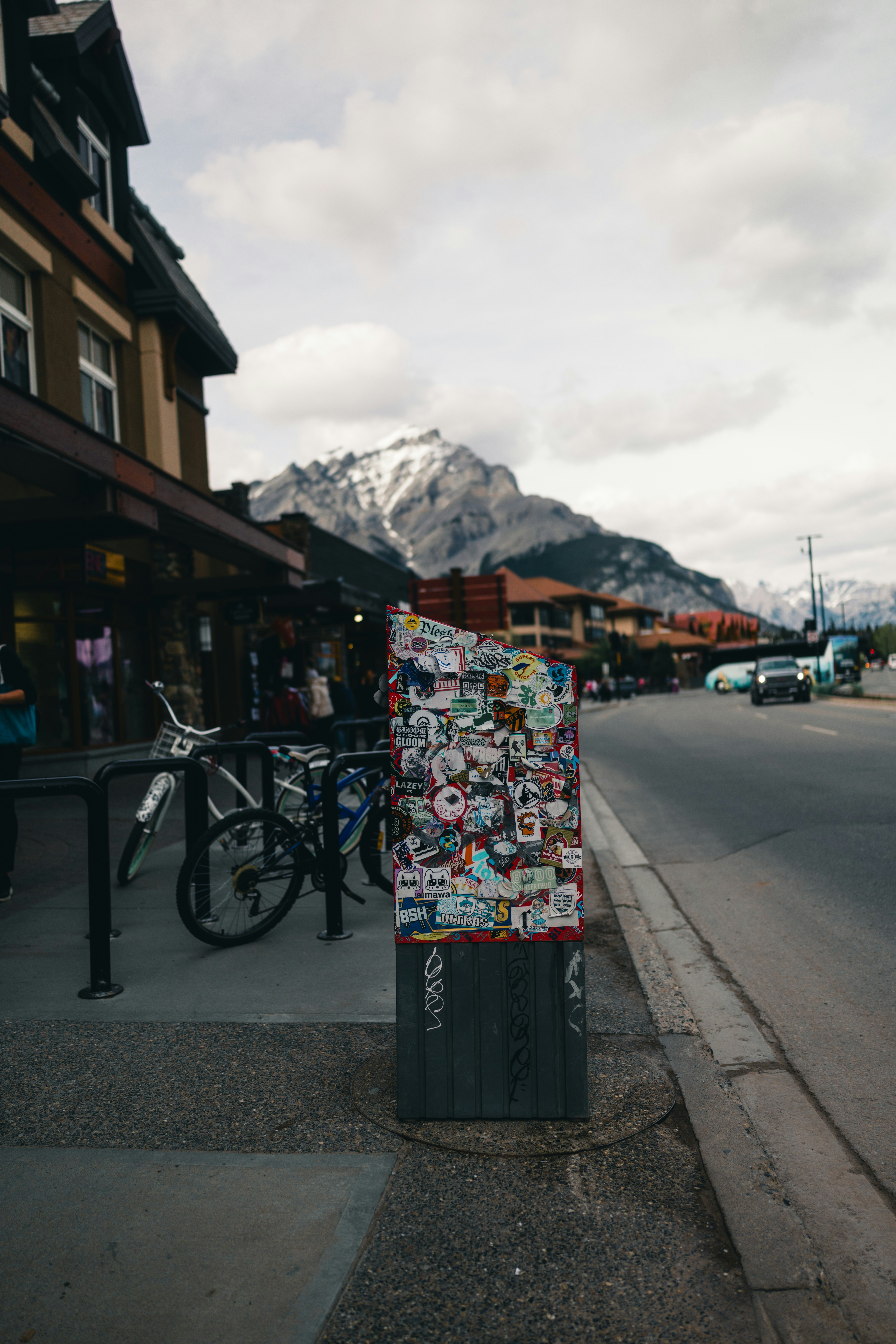 Stickered Utility Box in a Mountain Town Street