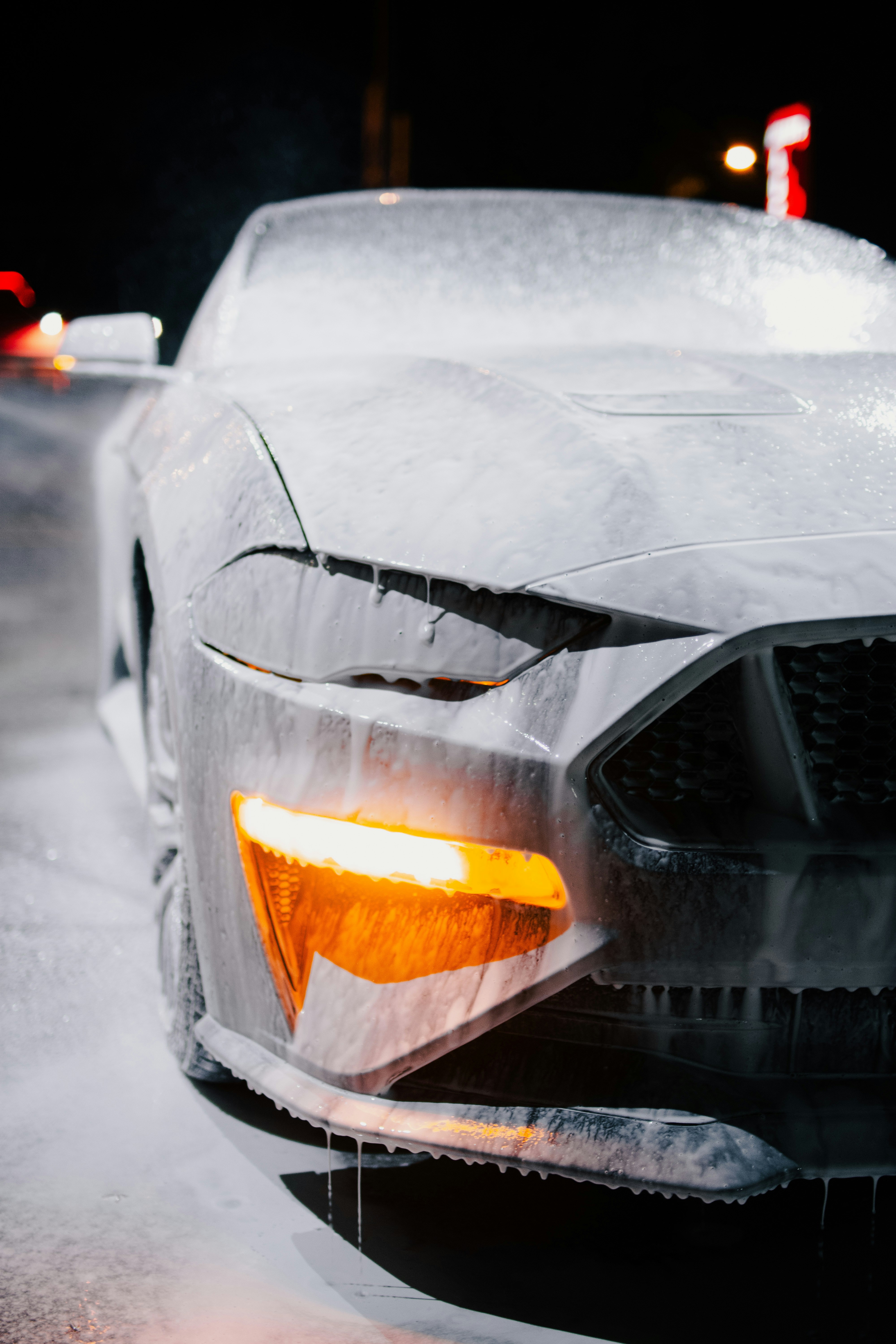 Ford Mustang GT | A mustang is covered in thick foam.