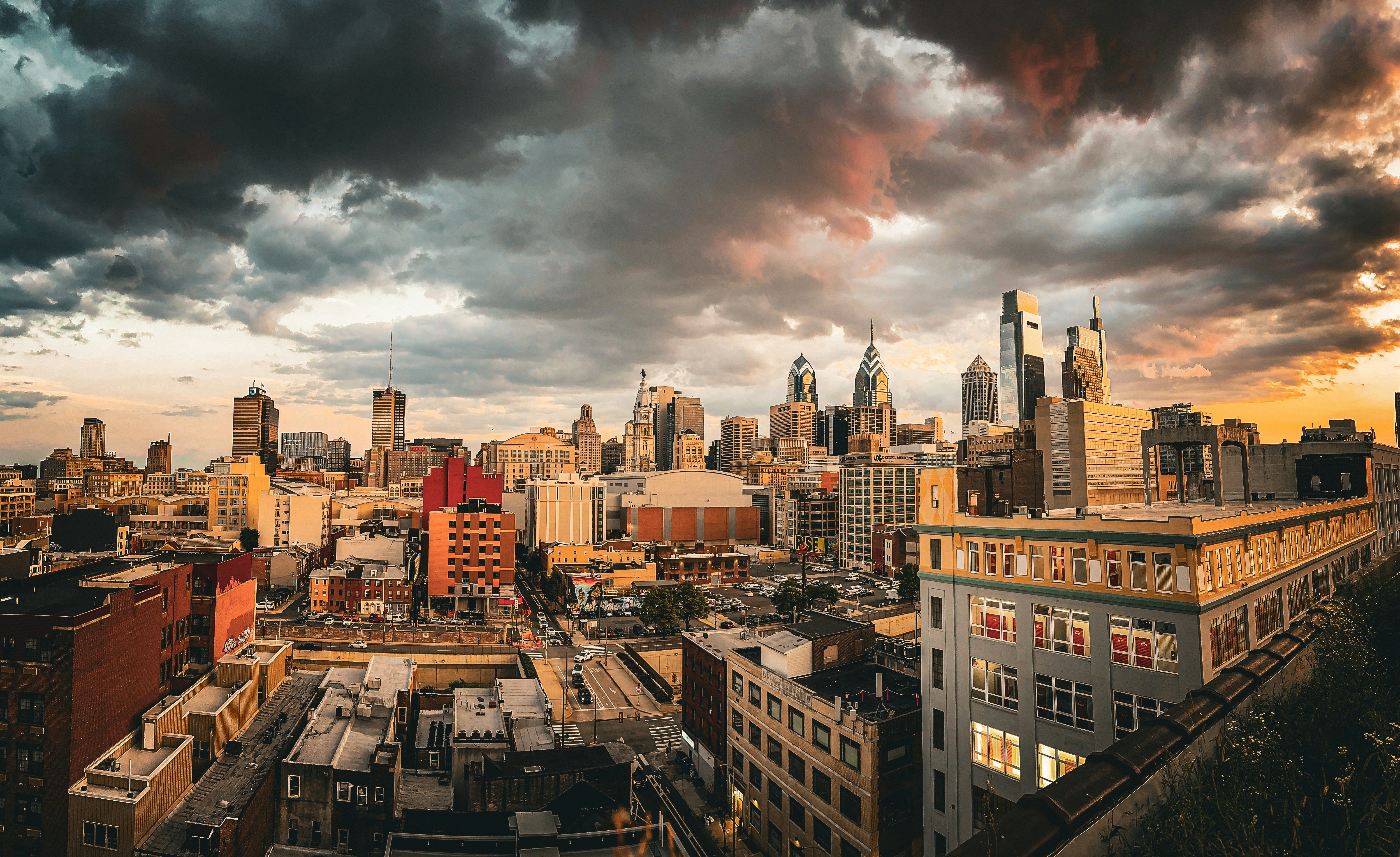 Dusk Over the Grid: Fire-Tinted Clouds Hover Above a Dense Downtown Skyline
