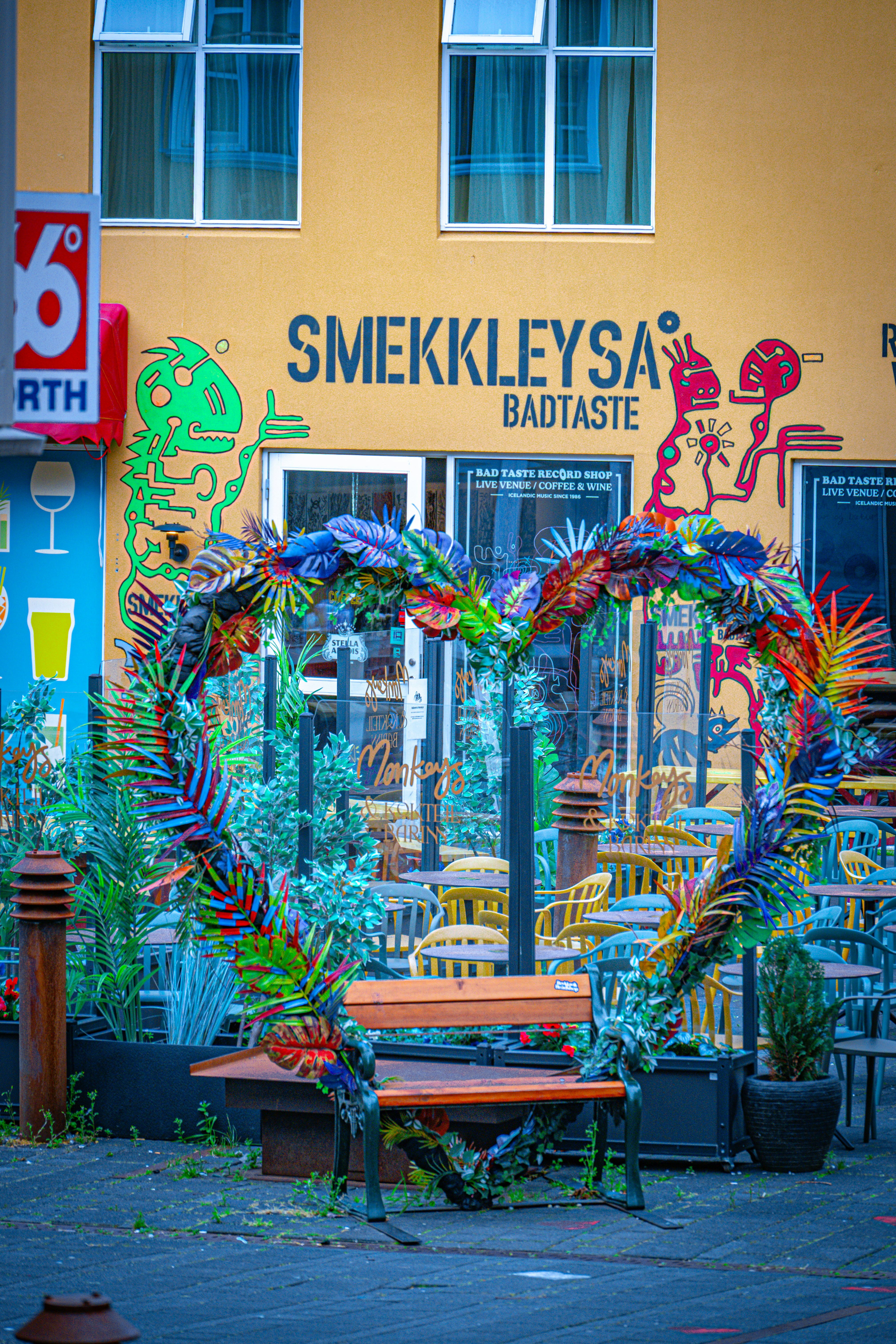 A heart-shaped decoration sits in front of a cafe.