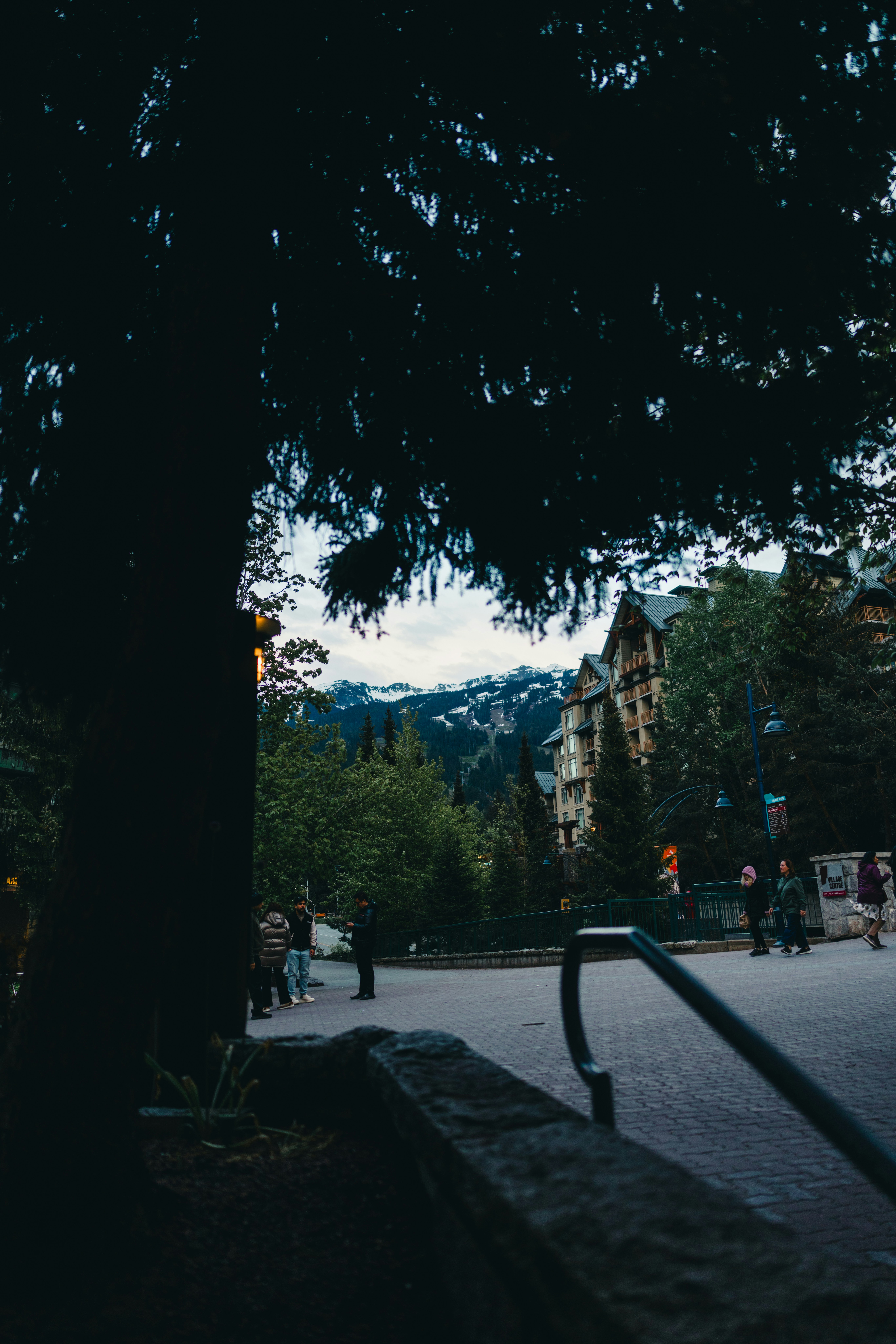 I miss Vancouver so much | Evening view of a building and mountains.