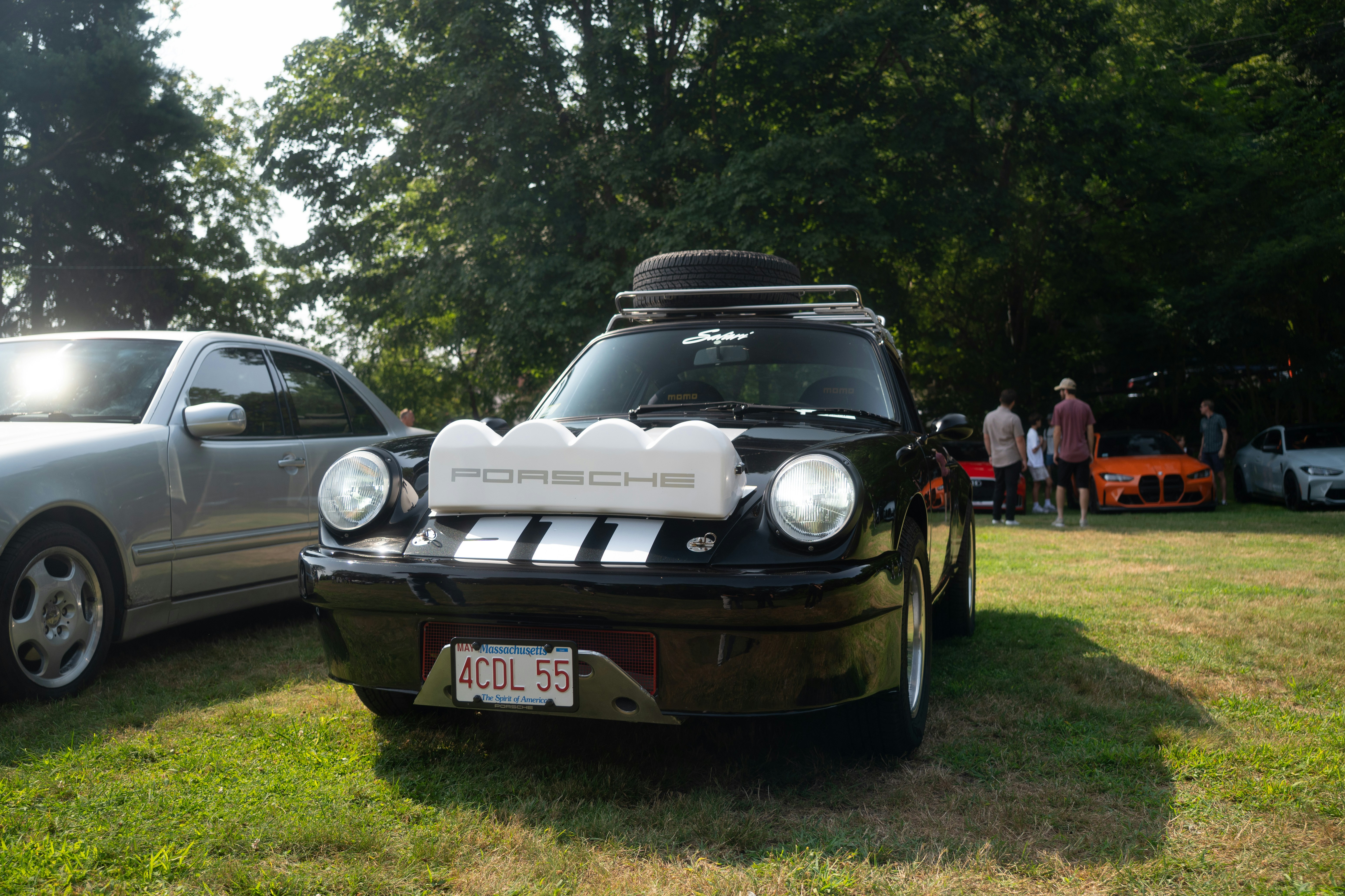 Front-and-Center Porsche at a sunlit car show