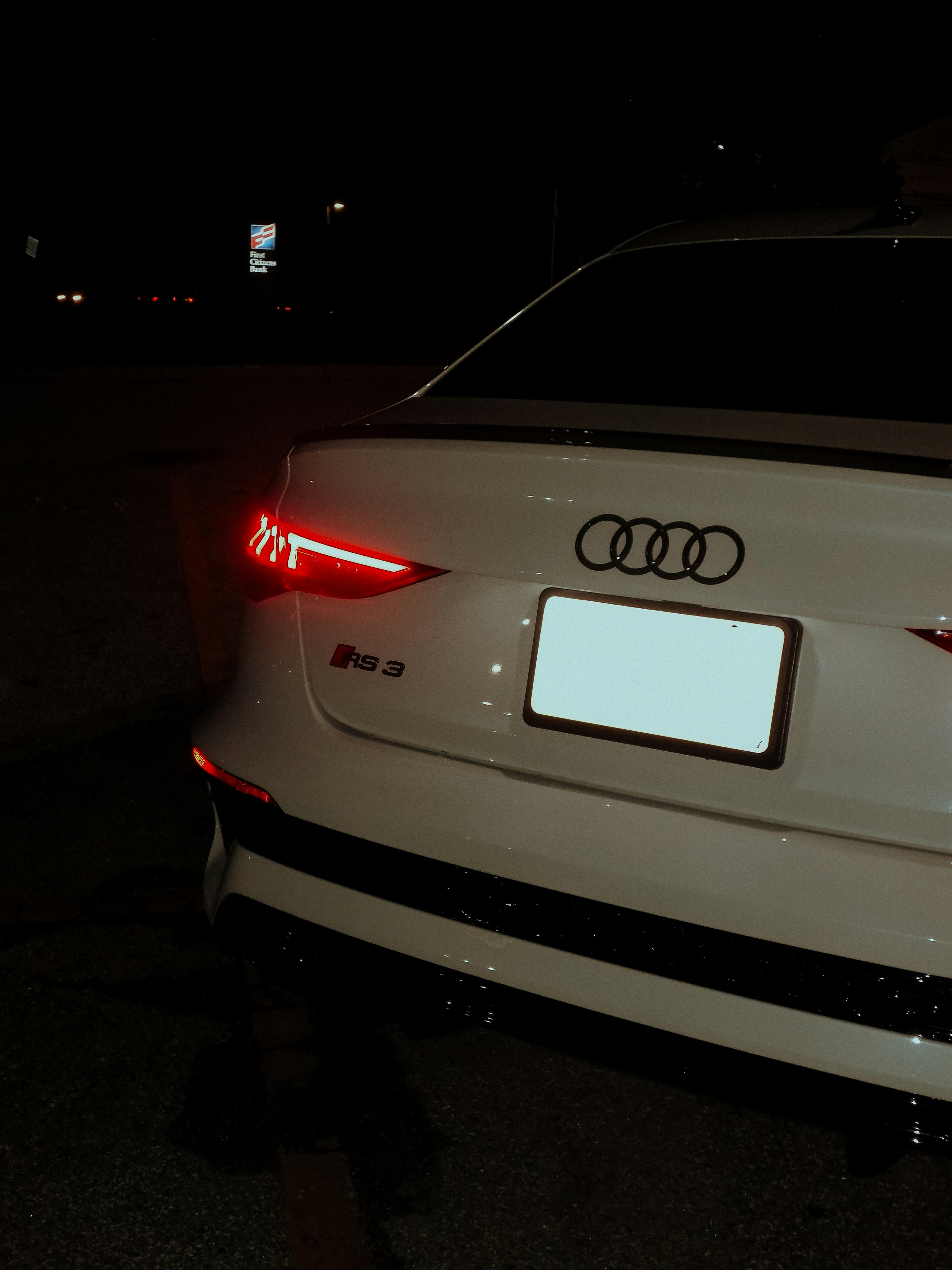 White audi rs3 at night.