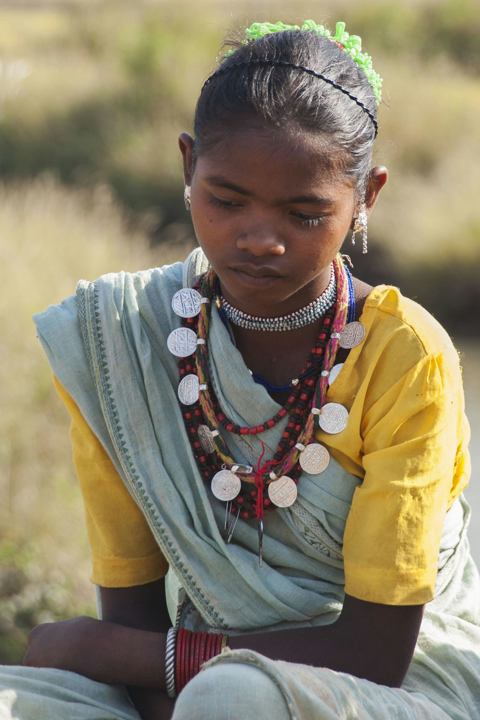 KONICA MINOLTA DIGITAL CAMERA | Young woman wearing traditional indian jewelry.