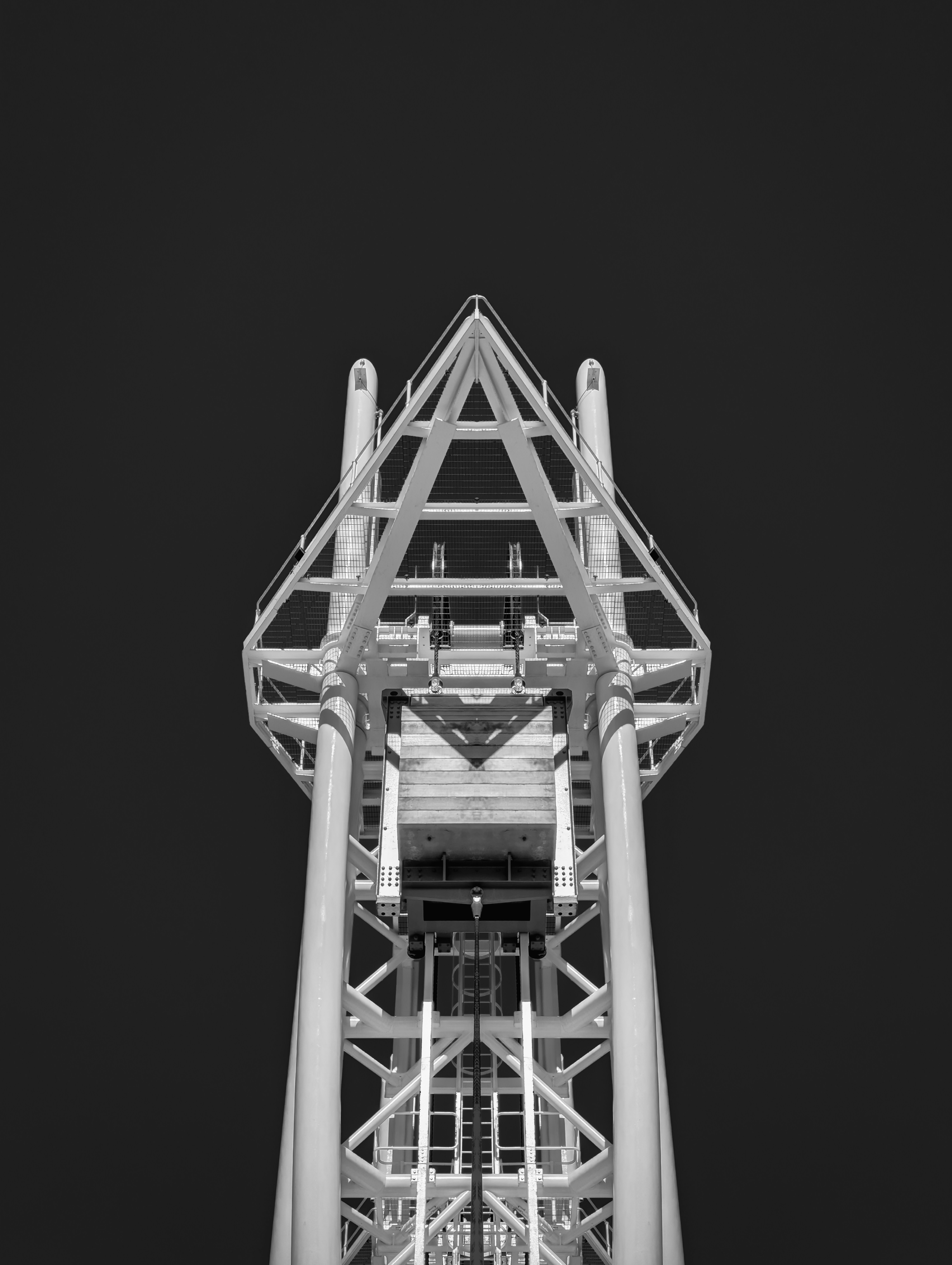 Symmetrical metal structure against a dark background. photo – Free ...