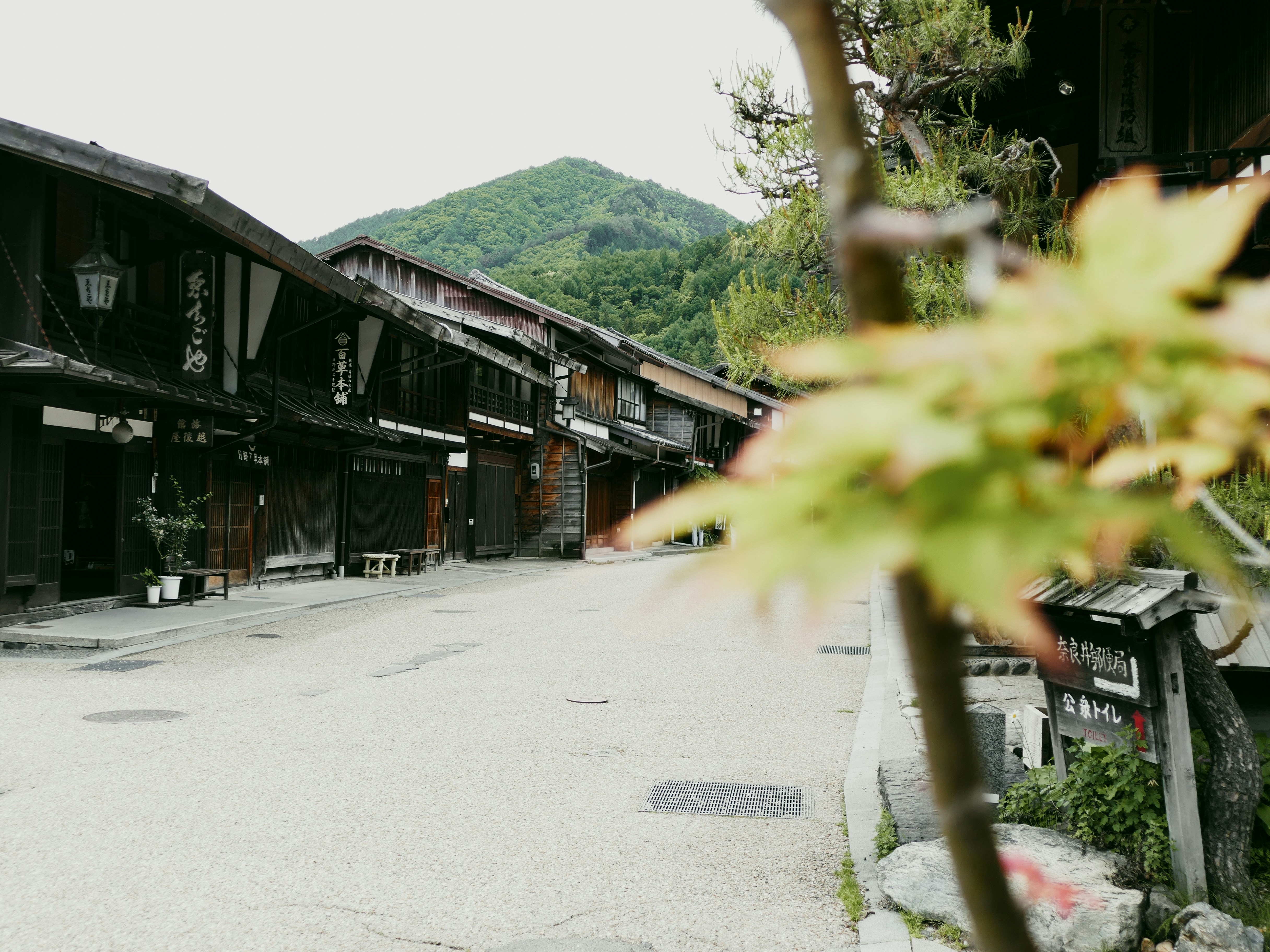 Street of Narai-juku-Japan | Traditional japanese street with wooden buildings.