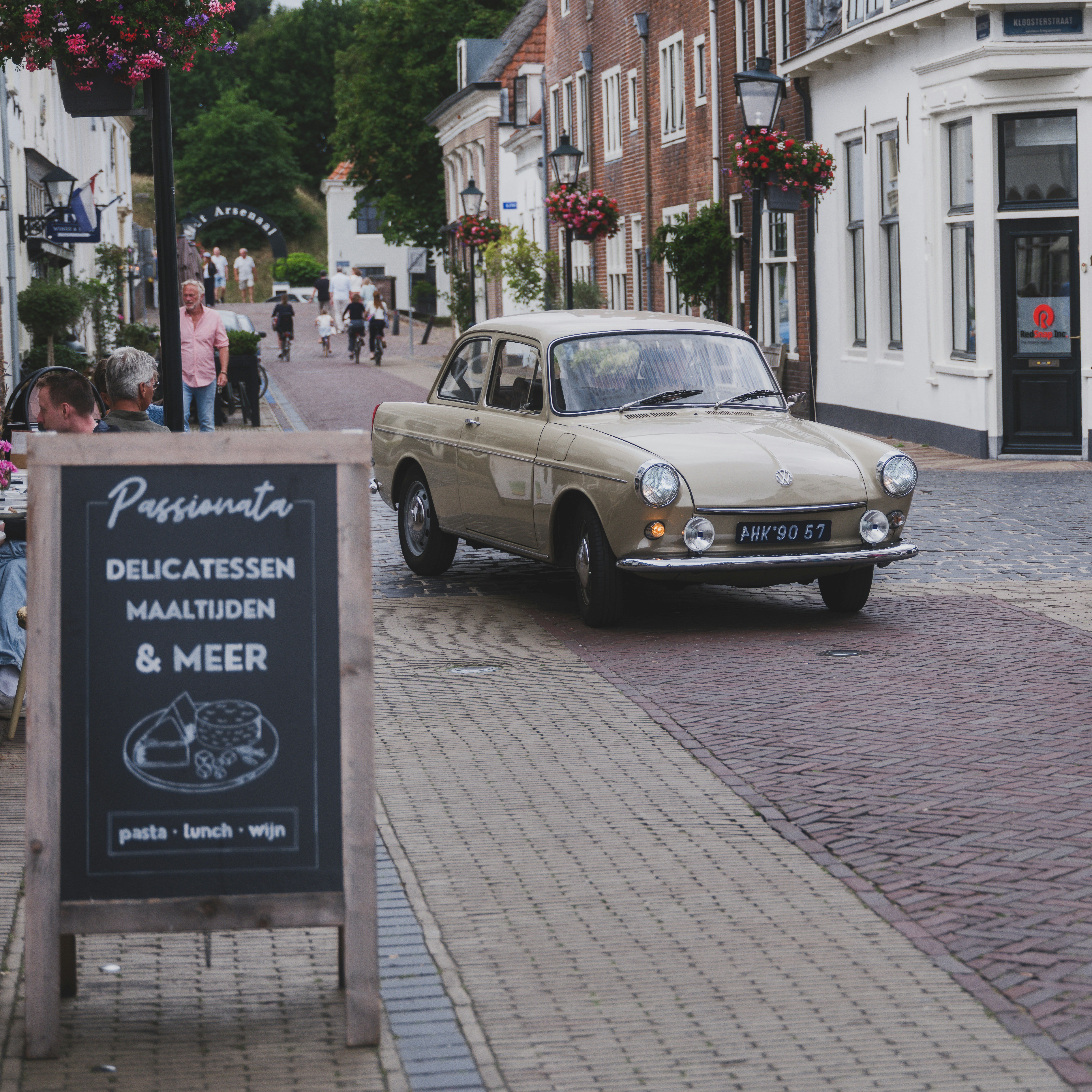 Beige Classic on Cobblestones: a Quiet Street Moment